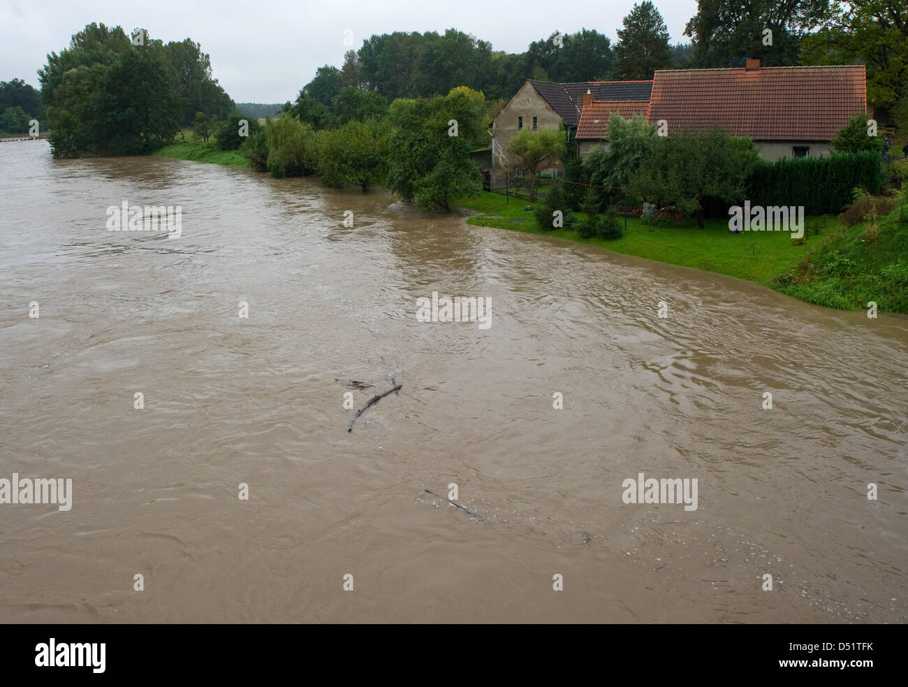 The Neisse river marking the border between Germany and Poland is ...