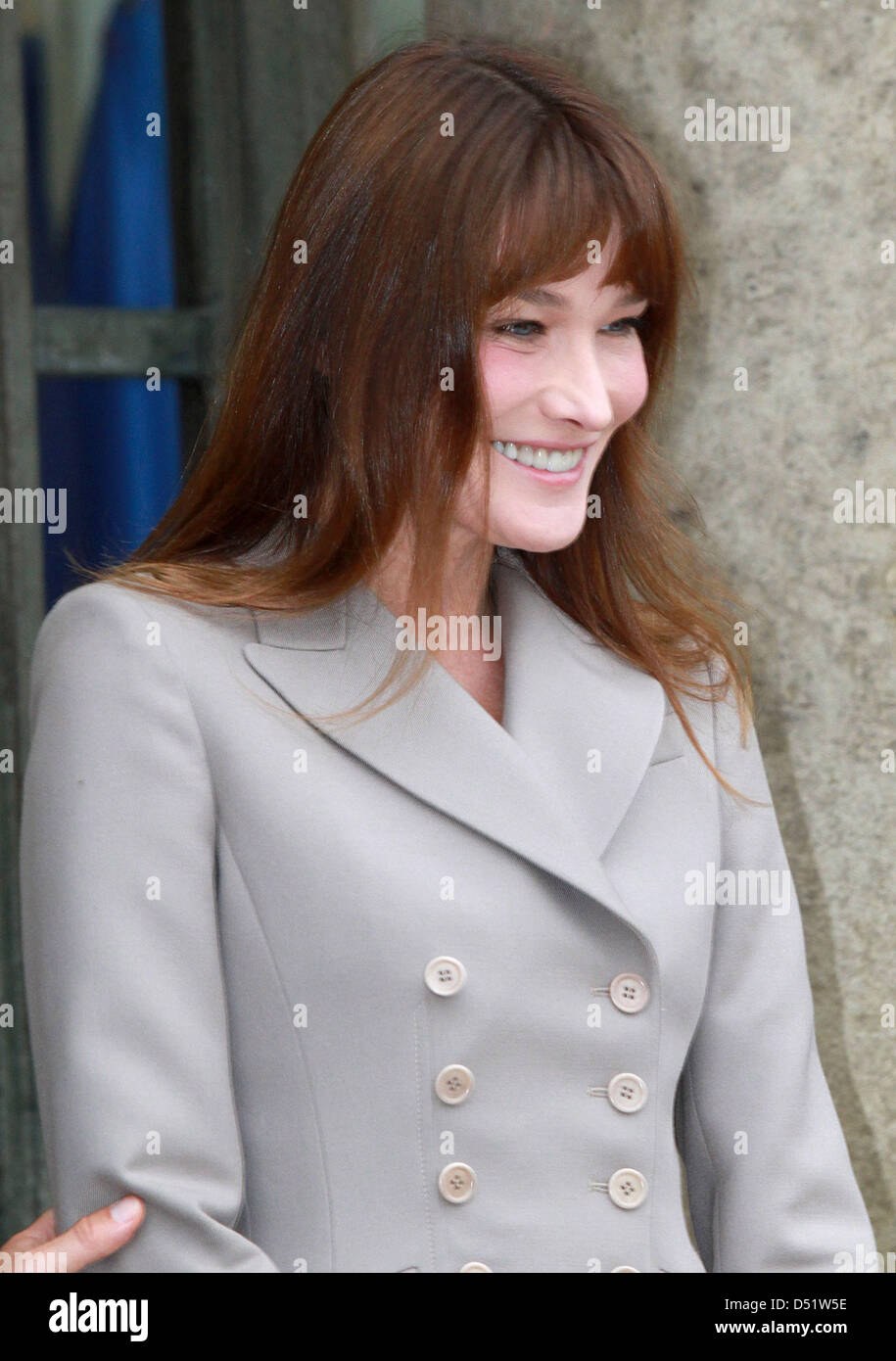 Carla Bruni, wife of French President Sarkozy, smiles after a reception ...