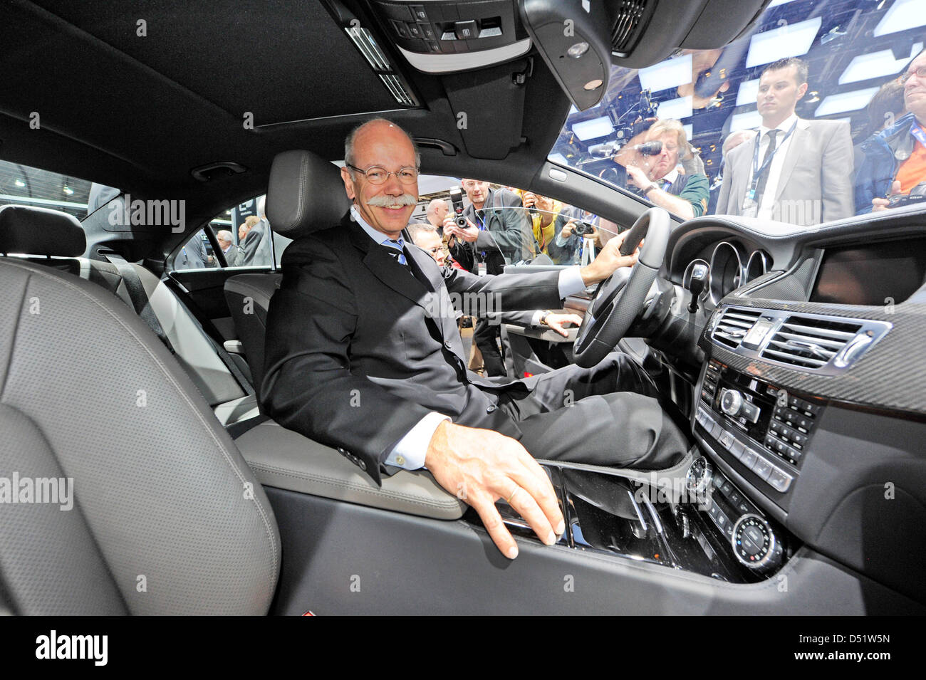Daimler CEO Dieter Zetsche smiles in the new Mercedes-Benz CLS at the ...