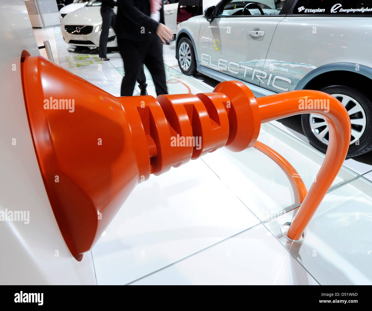An oversized plug of a Volvo Electric C30 is presented at the 2010 ...