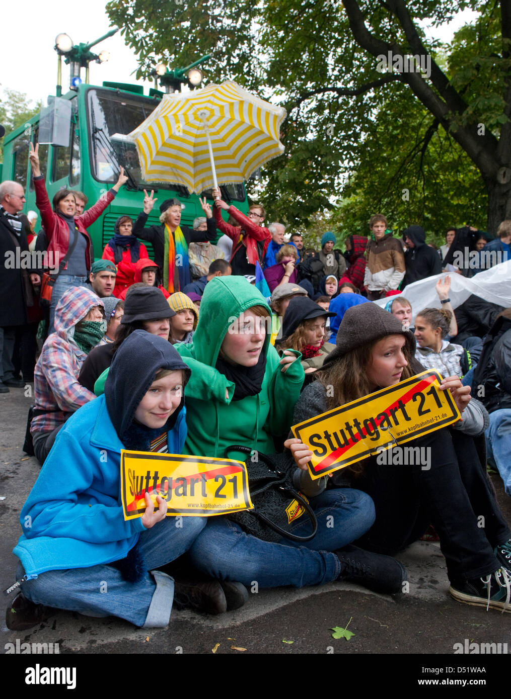 Police forces in riot gear take on people protesting against heavily ...