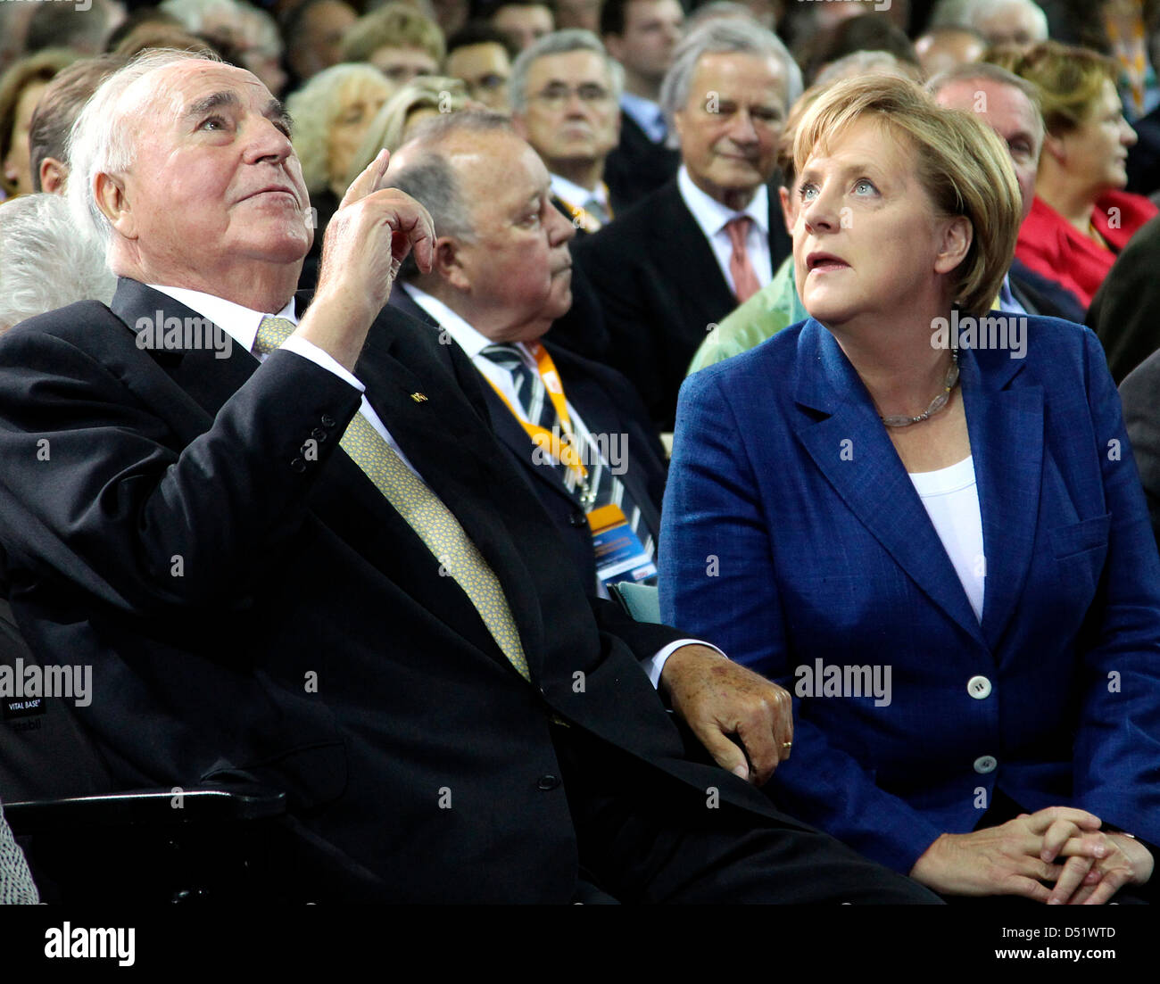 German Chancellor Angela Merkel and former chancellor Hemut Kohl (L ...