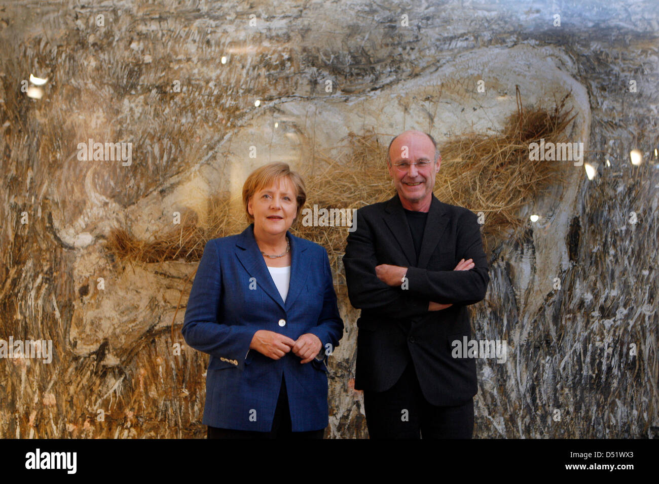 German Chancellor Angela Merkel and artist Anselm Kiefer pose for a ...