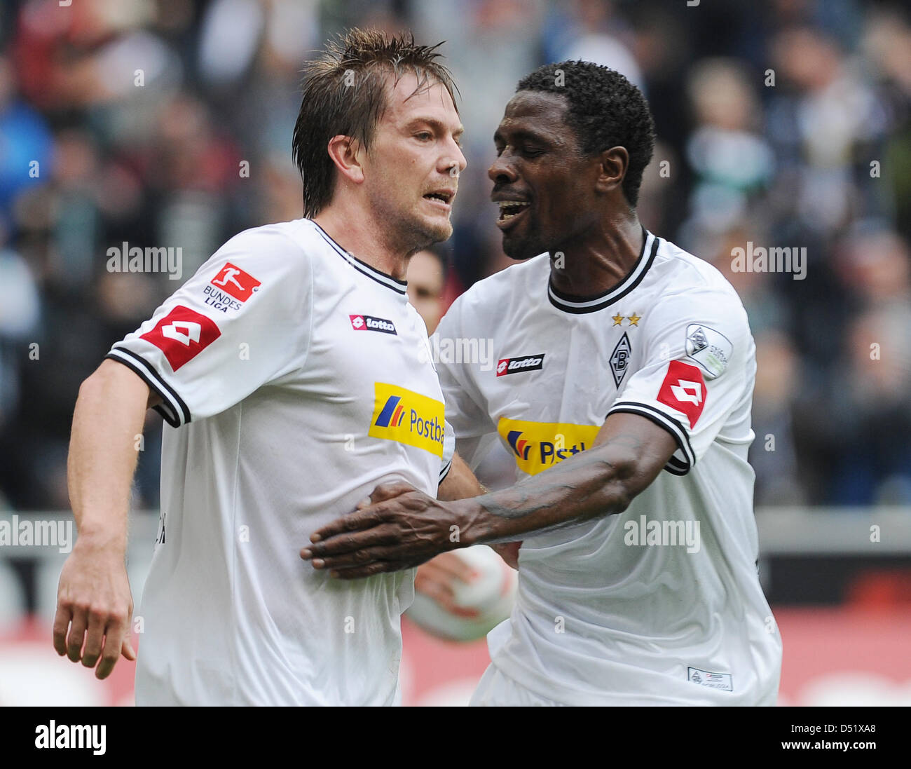 Moenchengladbach's Thorben Marx (L) celebrates his 1-1 goal with his ...