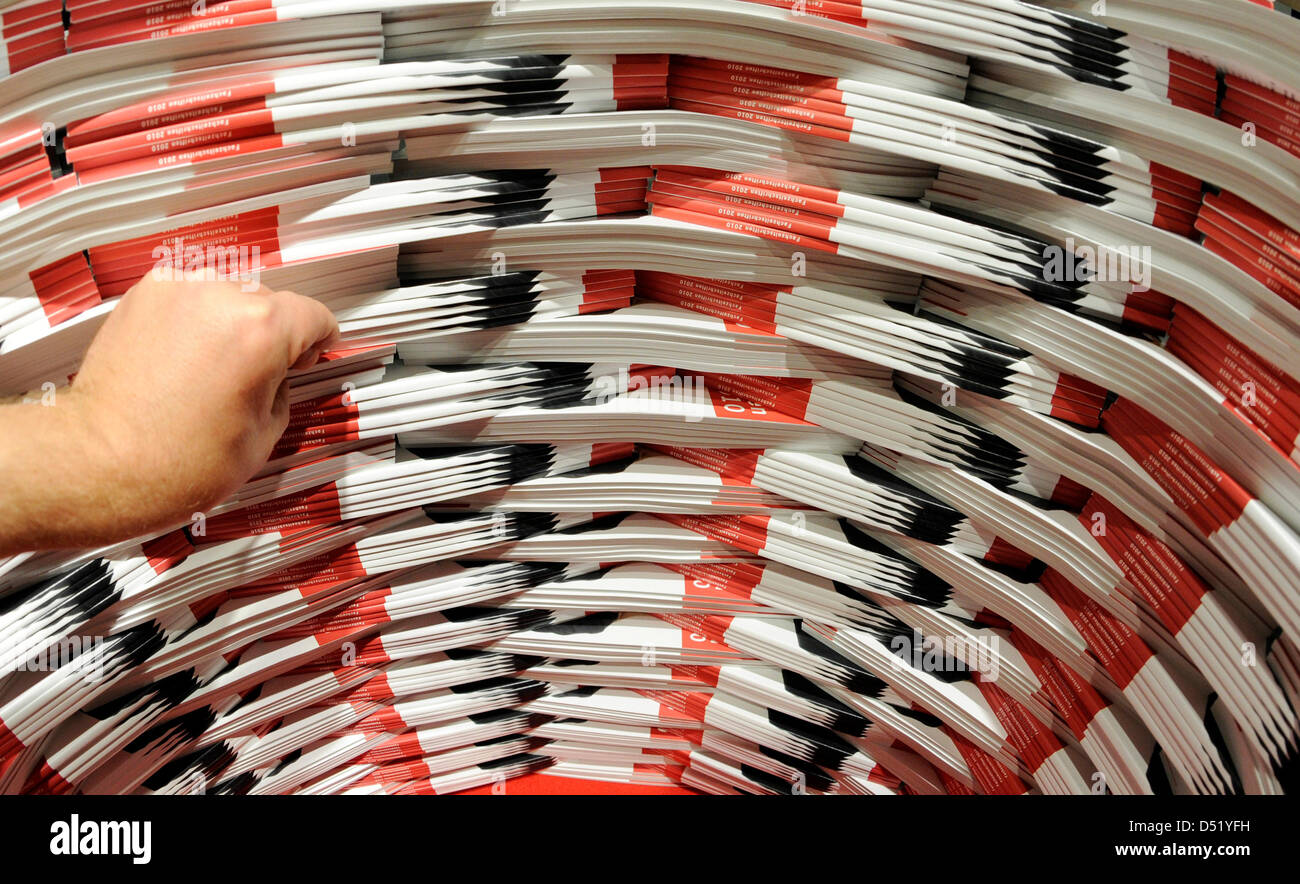 A stack of professional journals is featured at the Book Fair in ...