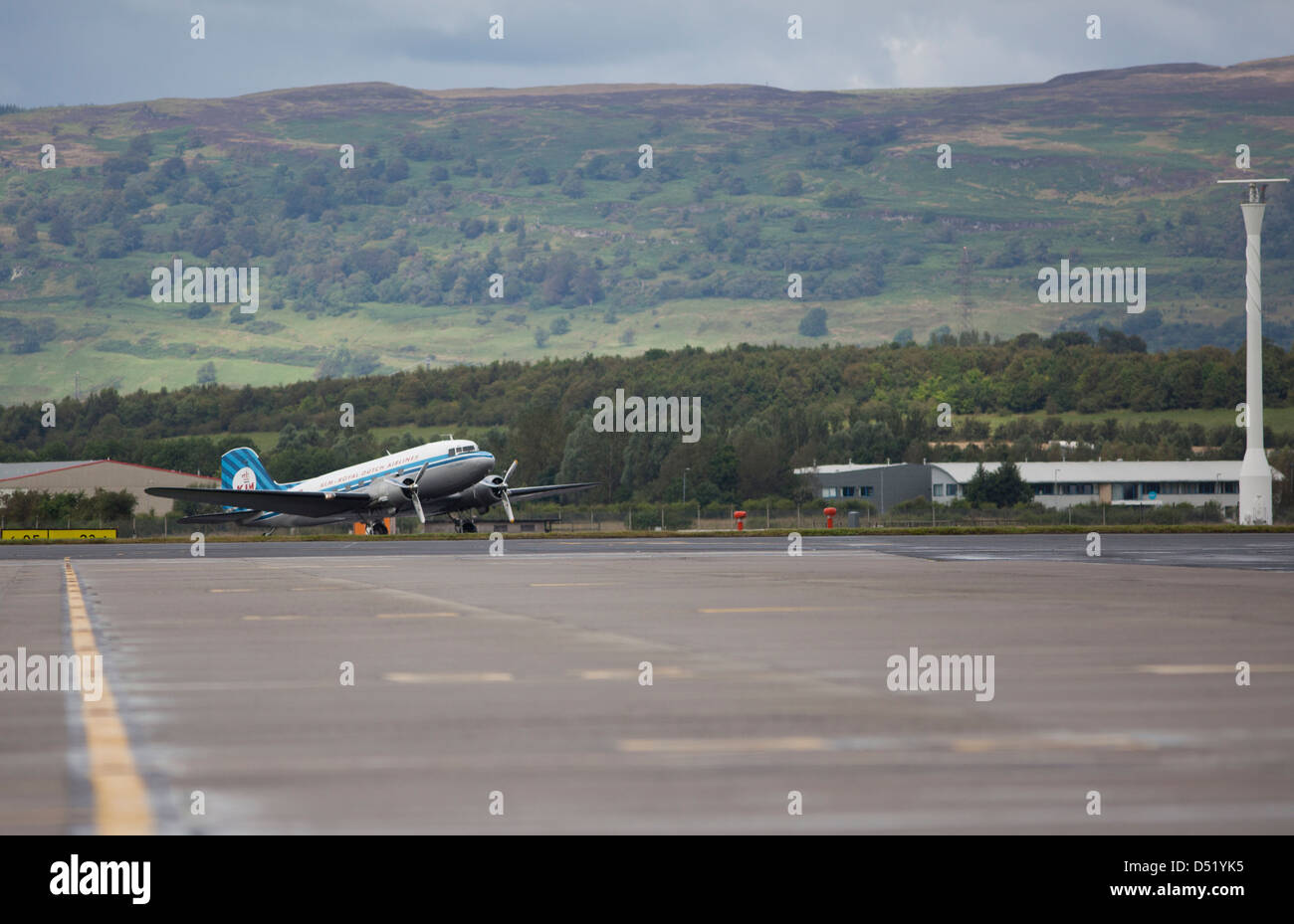 A KLM Royal Dutch Airline twin prop aircraft flying out of a Scottish ...
