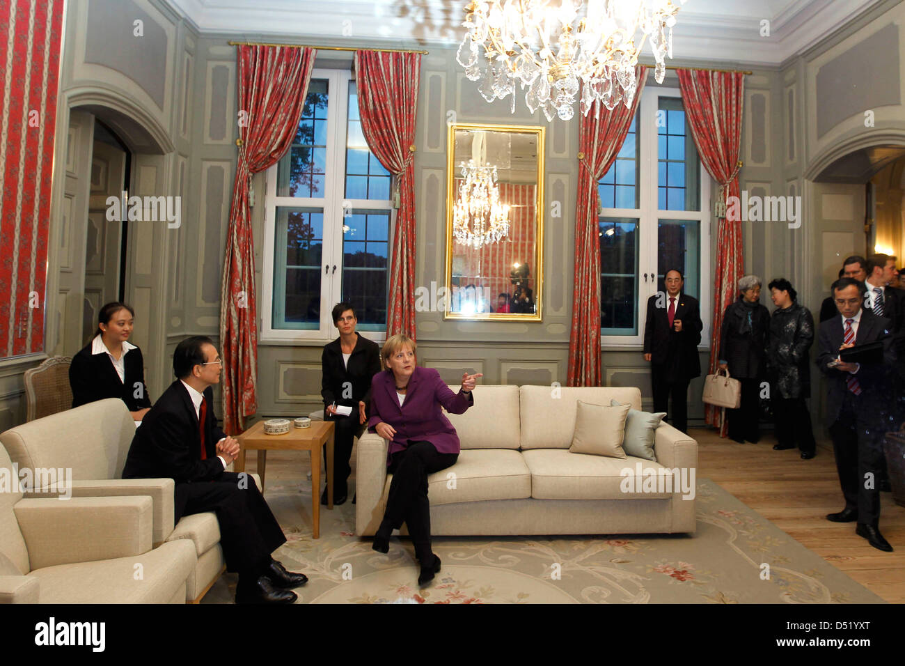 German Chancellor Angela Merkel (R) welcomes Chinese Prime Minister Wen ...