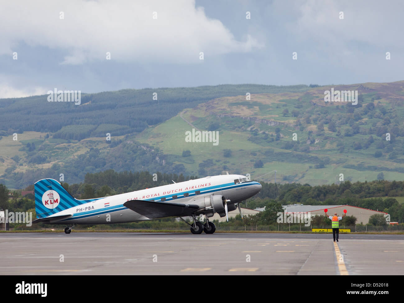 A KLM Royal Dutch Airline twin prop aircraft flying out of a Scottish ...