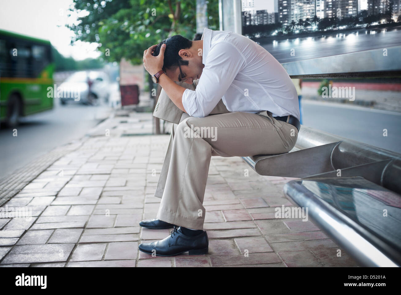 Sitting On Bus Stop Bench High Resolution Stock Photography and Images ...