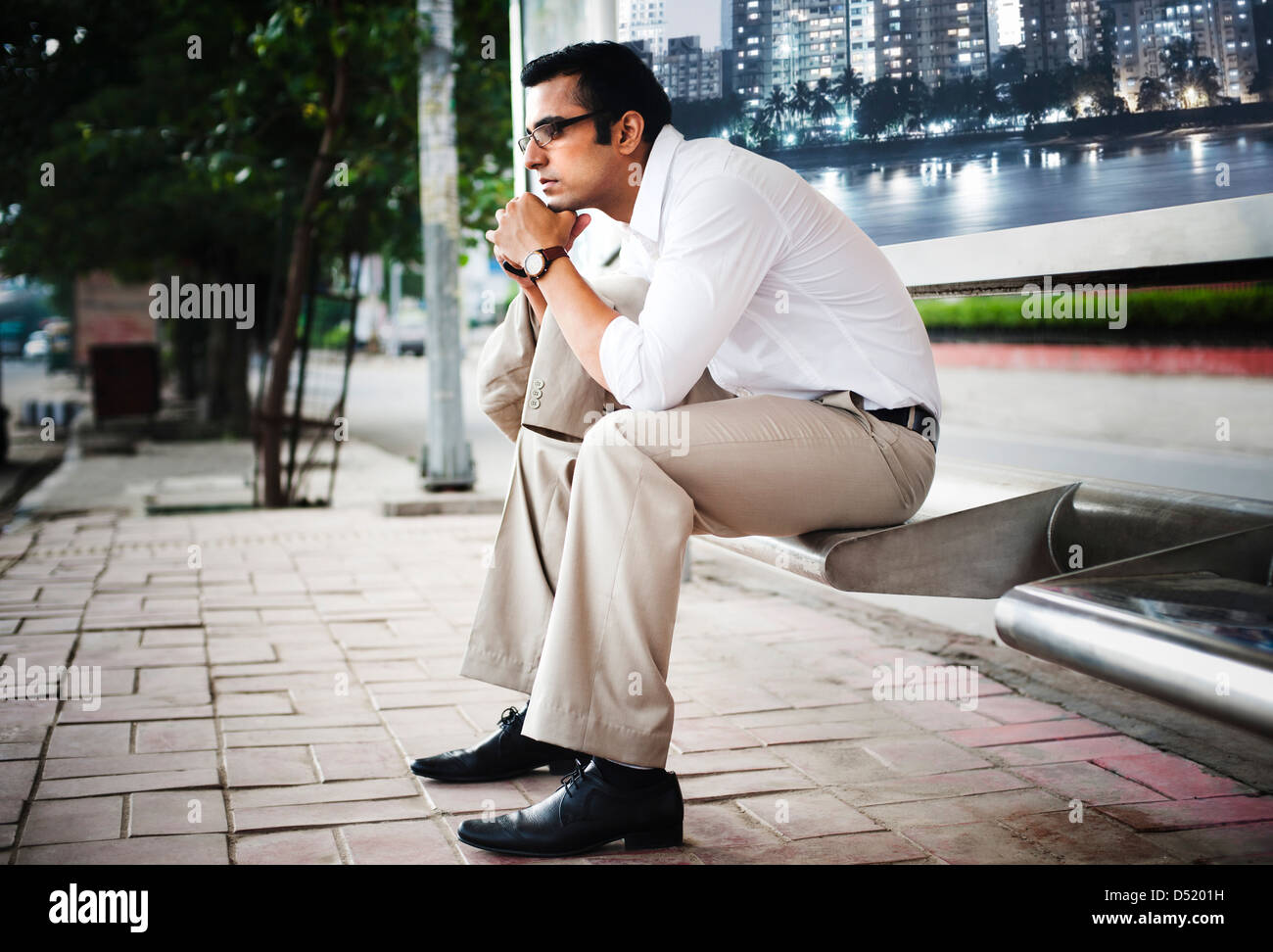 Sitting On Bus Stop Bench High Resolution Stock Photography and Images ...