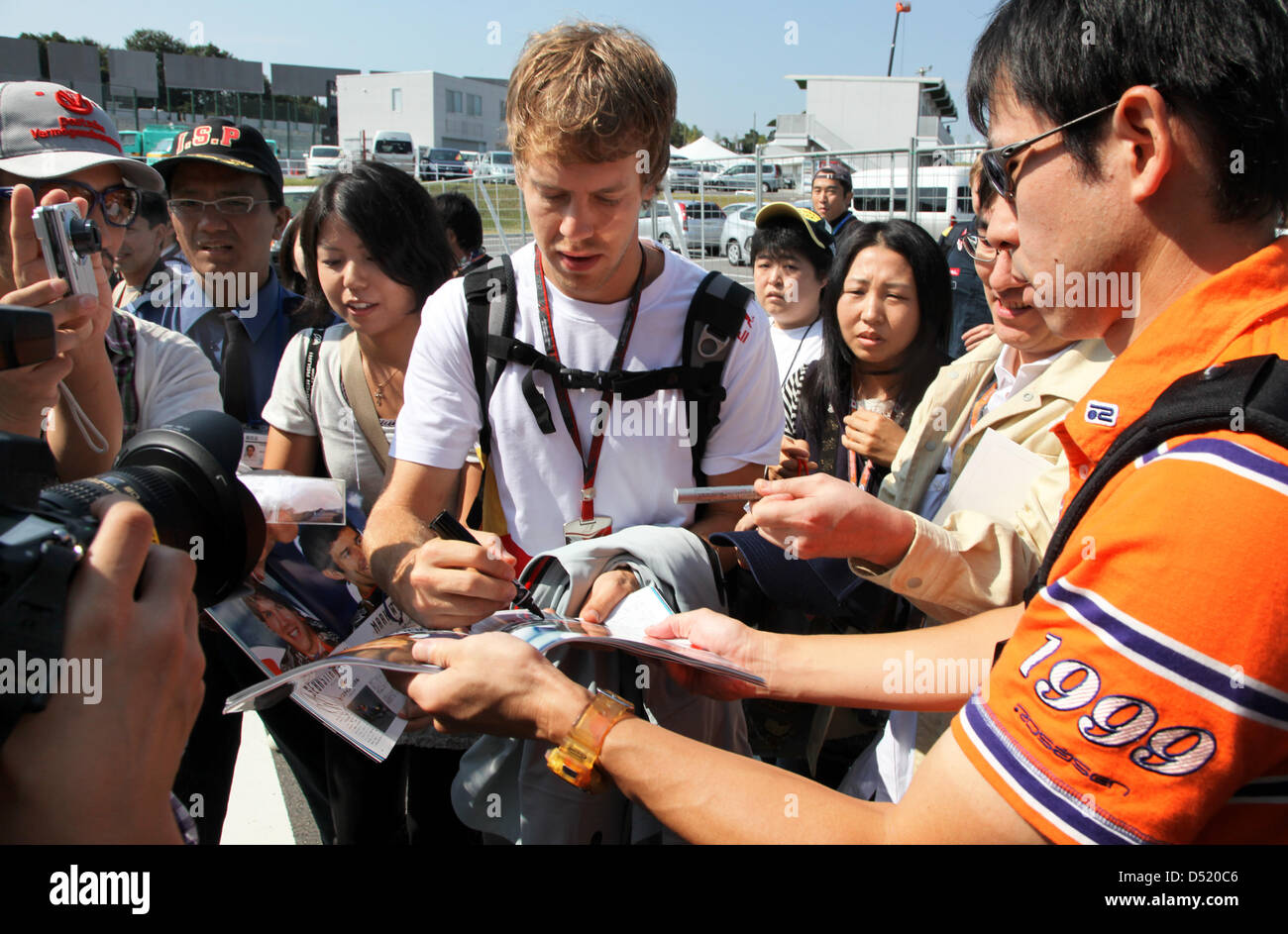 German driver Sebastian Vettel of Red Bull Racing arrives in the ...
