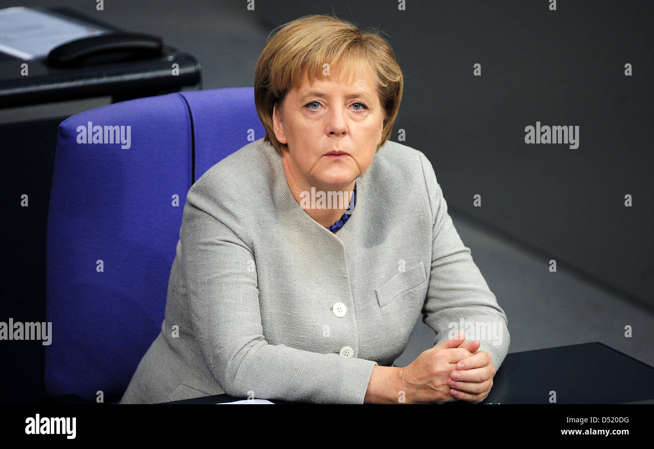German Chancellor Angela Merkel follows a debate of the German ...
