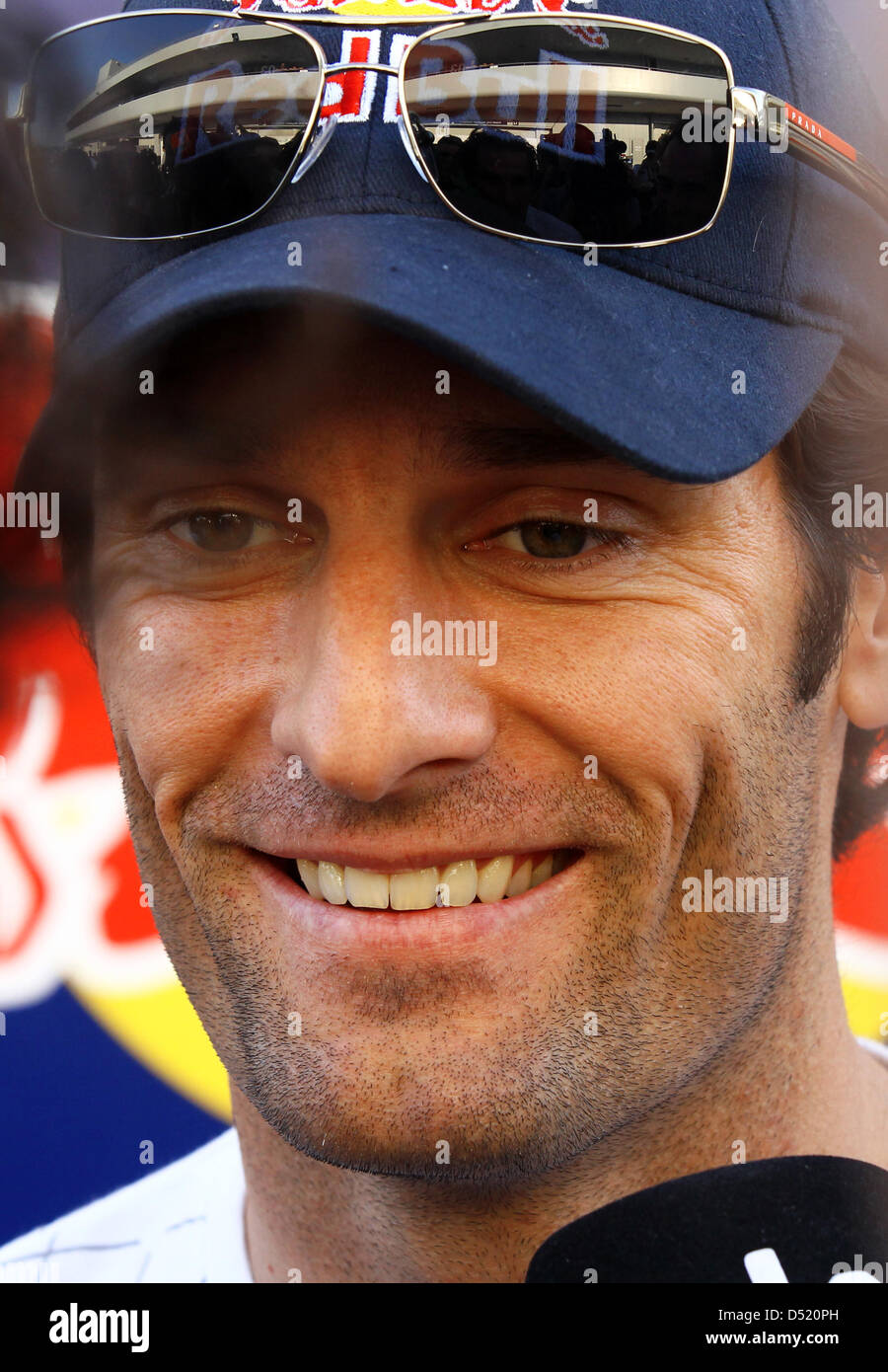 Australian driver Mark Webber of Red Bull Racing gives an interview at ...