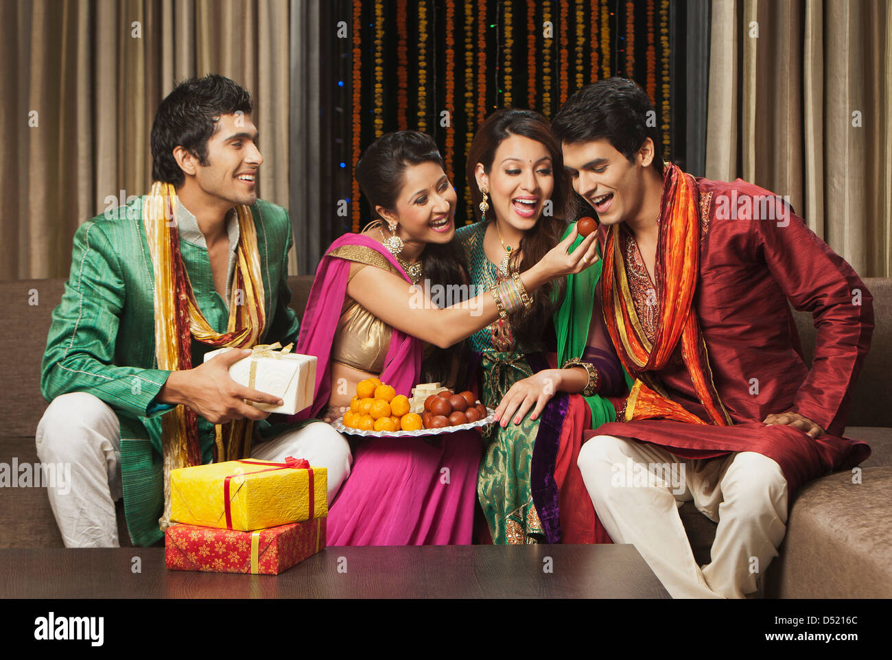 Friends celebrating Diwali Stock Photo - Alamy