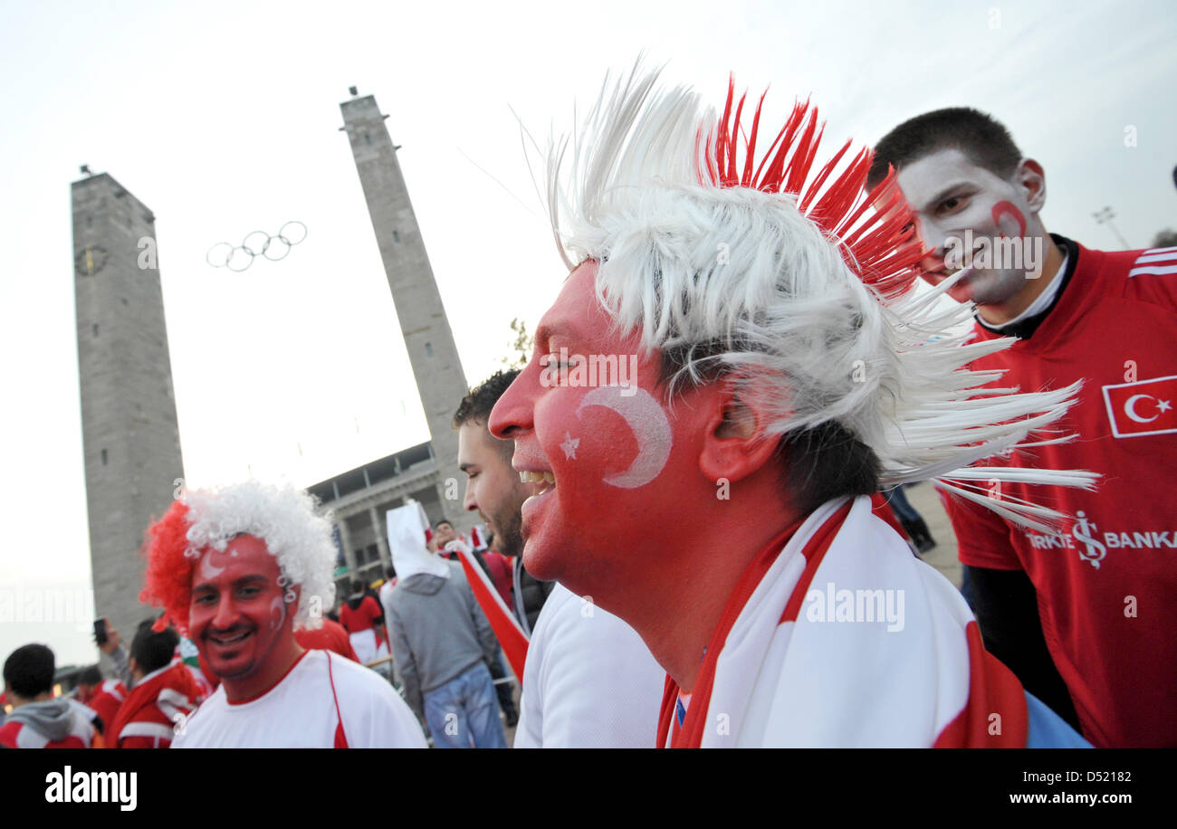 Turkish soccer fans celebrate their team at the Olympic Stadium in ...