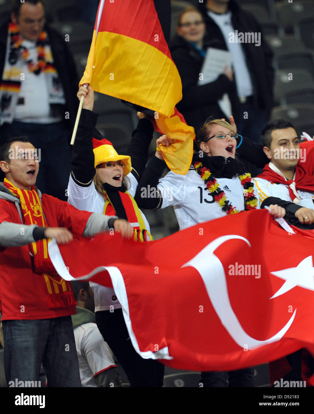 Turkish and German soccer fans celebrate their teams at the Olympic ...