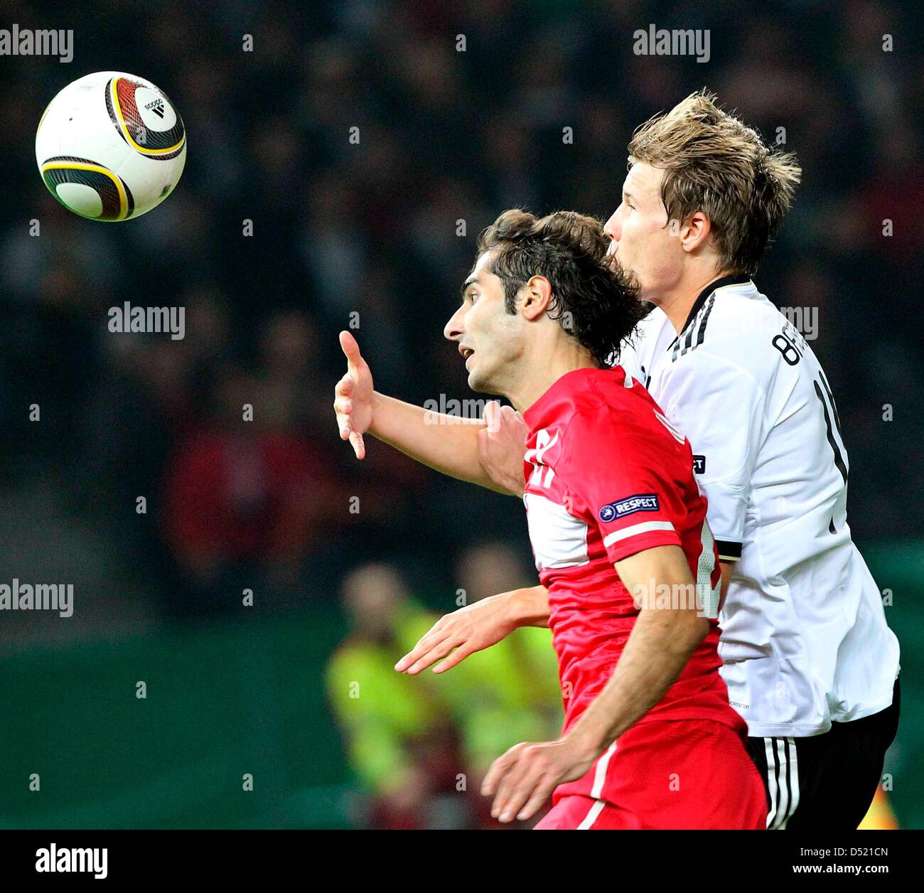 German player Holger Badstuber (R) and Turkish player Halil Altintop ...
