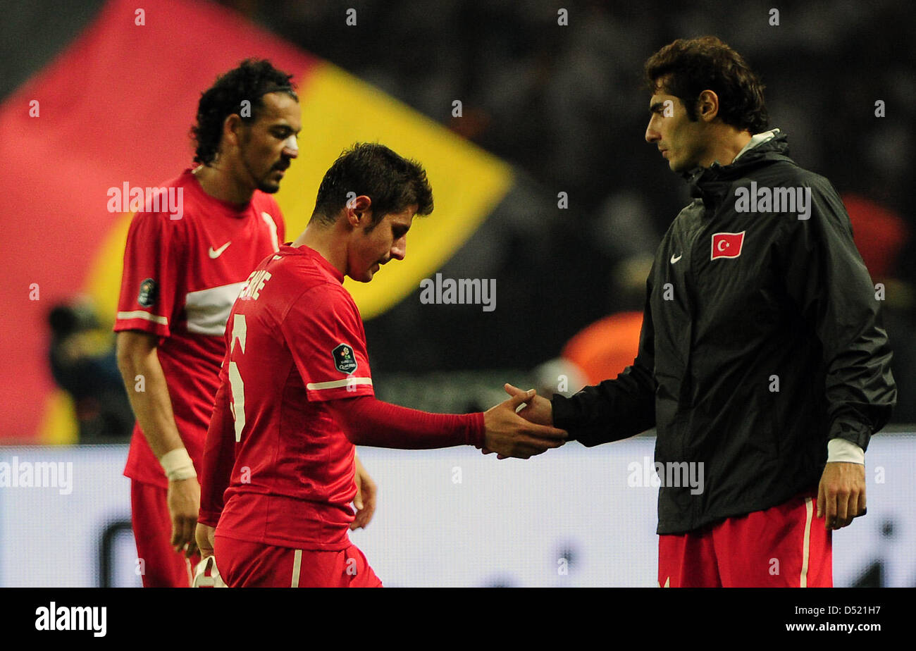 Turkish players Servet Ceti, Emre Beloezoglu and Halil Altintop (L-R ...