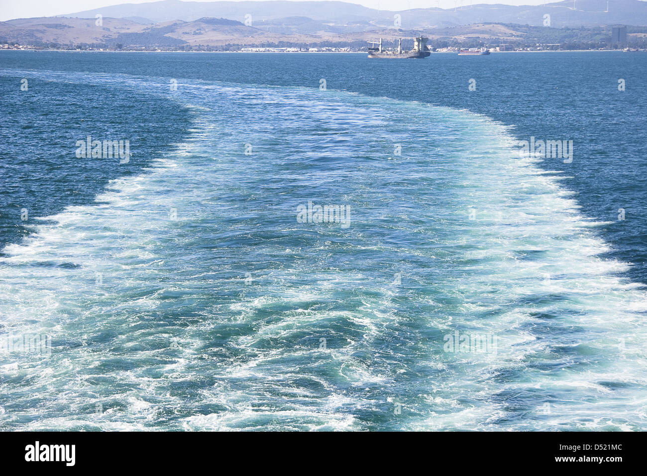 Ship trace on the water Stock Photo - Alamy