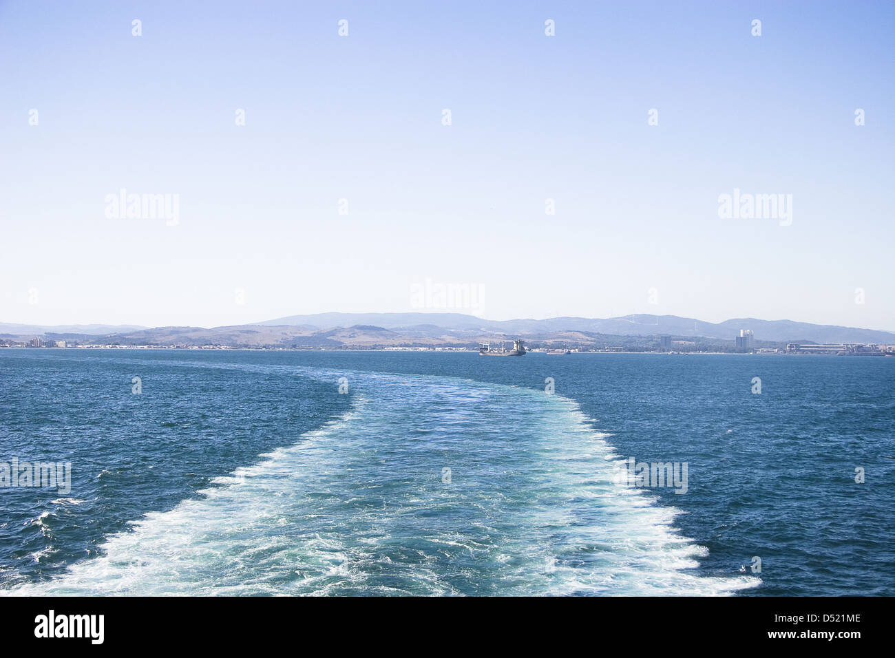 Ship trace on the water Stock Photo - Alamy