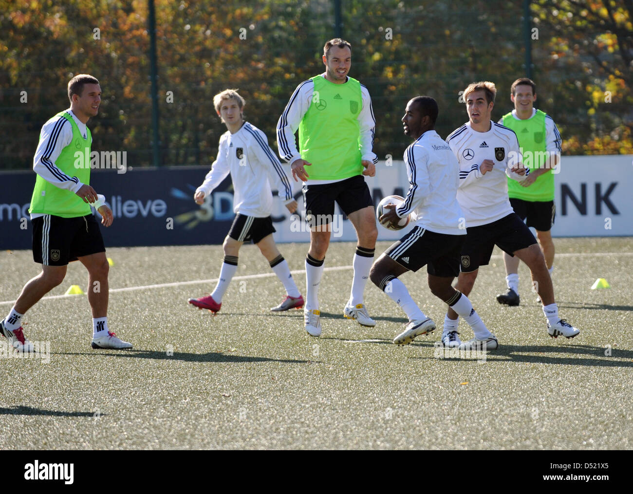 Players of the German national soccer team warm up on artifical turf in ...