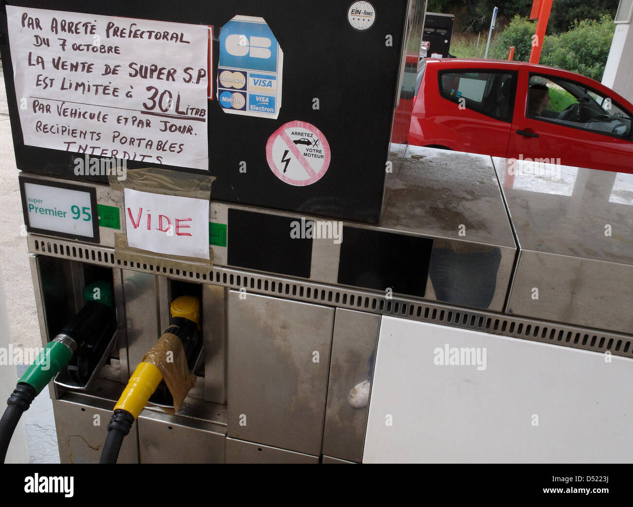 A paper reads 'Selling of Super petrol per vehicle and day by prefect ...