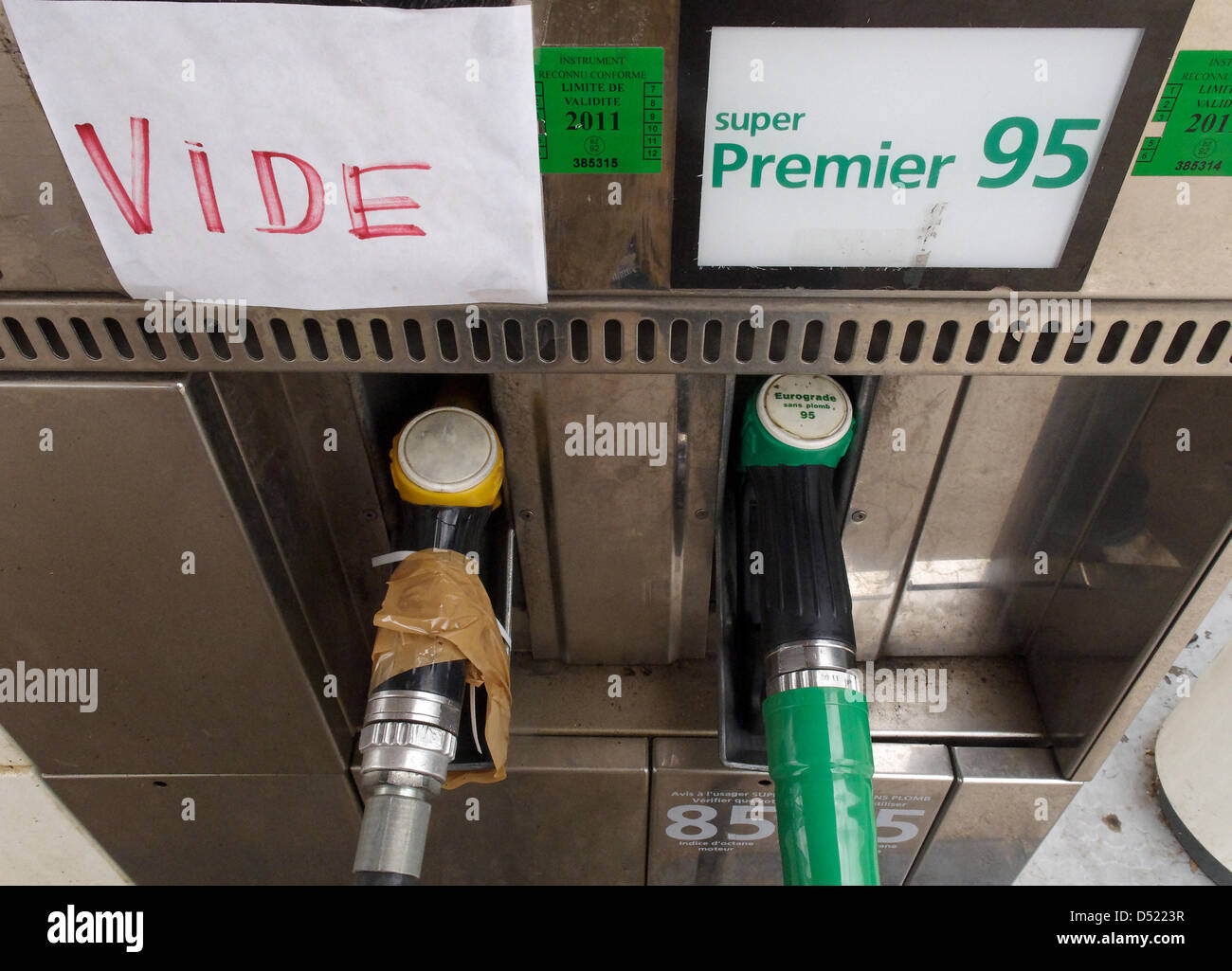 A paper reads 'Selling of Super petrol per vehicle and day by prefect ...