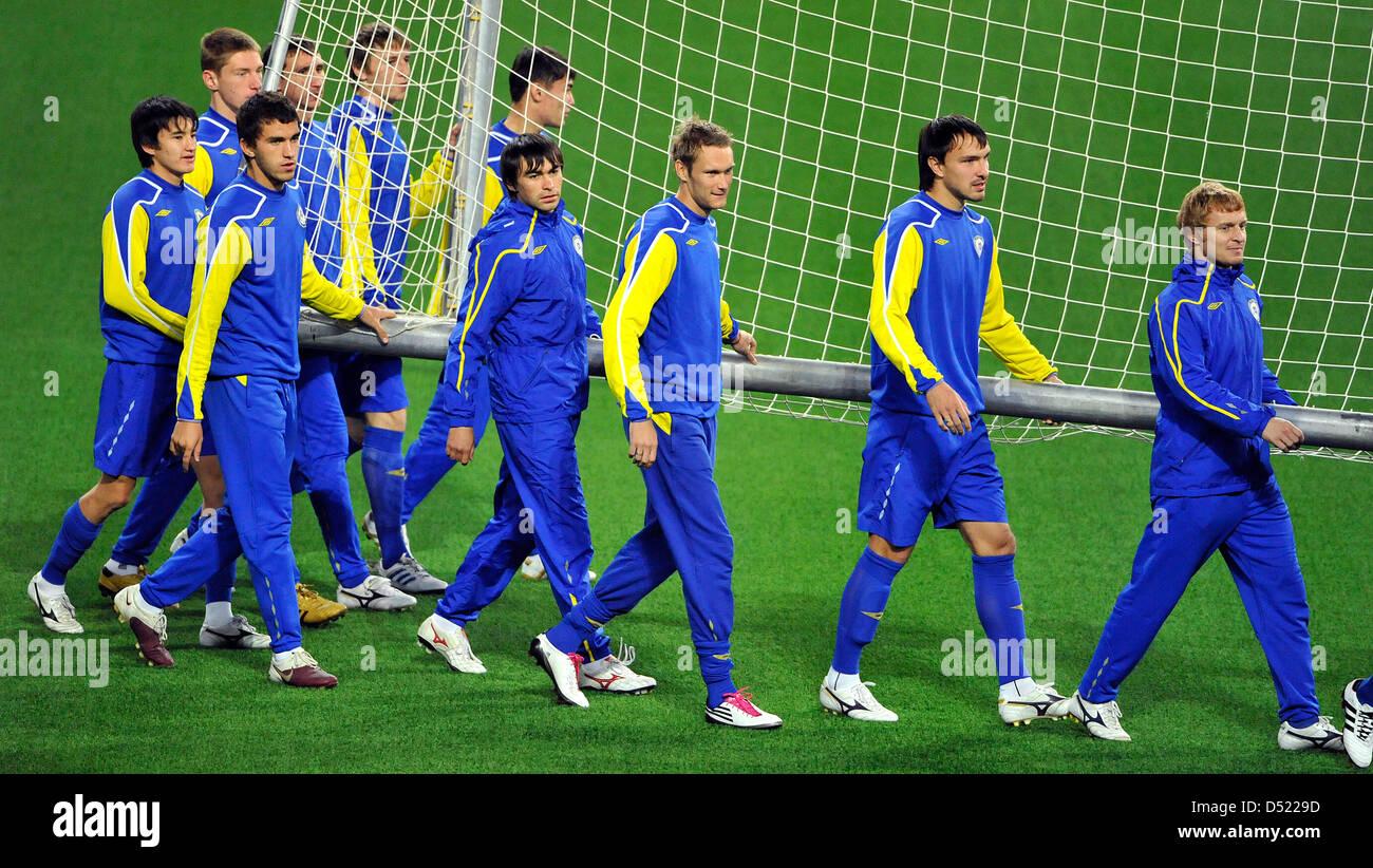 The players of the Kazakh national soccer team carry a goal during ...