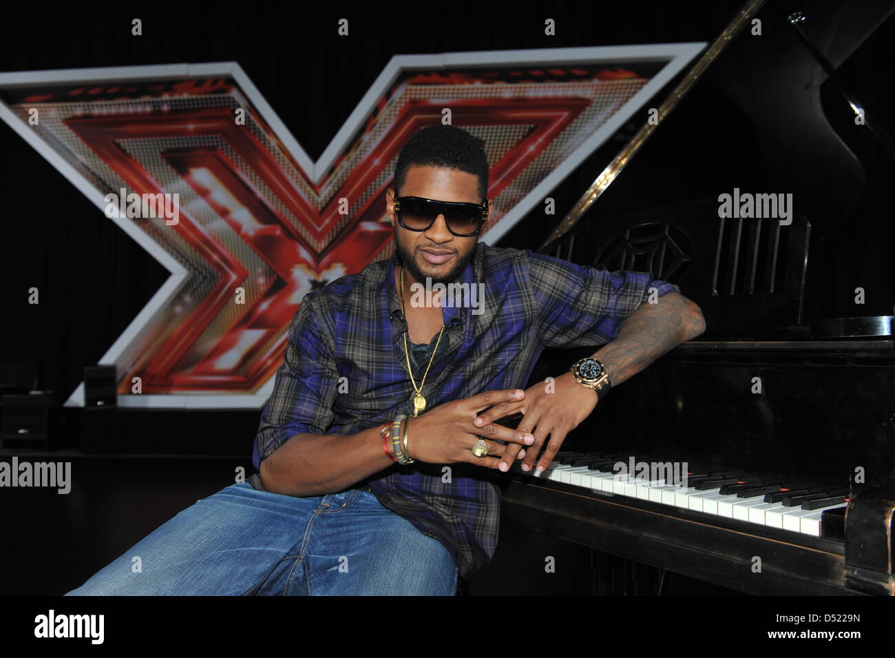 US singer Usher poses for a picture at the studio of the German ...