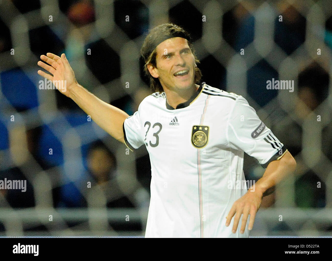 Germany's Mario Gomez celebrates his score for a 2-0 lead during UEFA ...