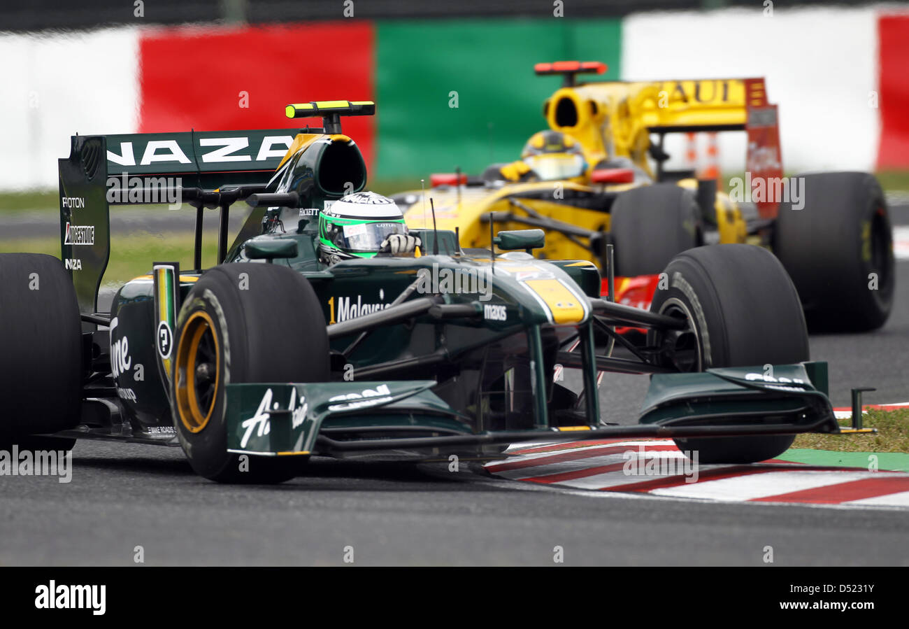 Finnish driver Heikki Kovalainen of Lotus drives on the race track ...