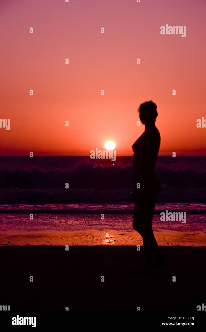 Woman in sunset hi-res stock photography and images - Alamy