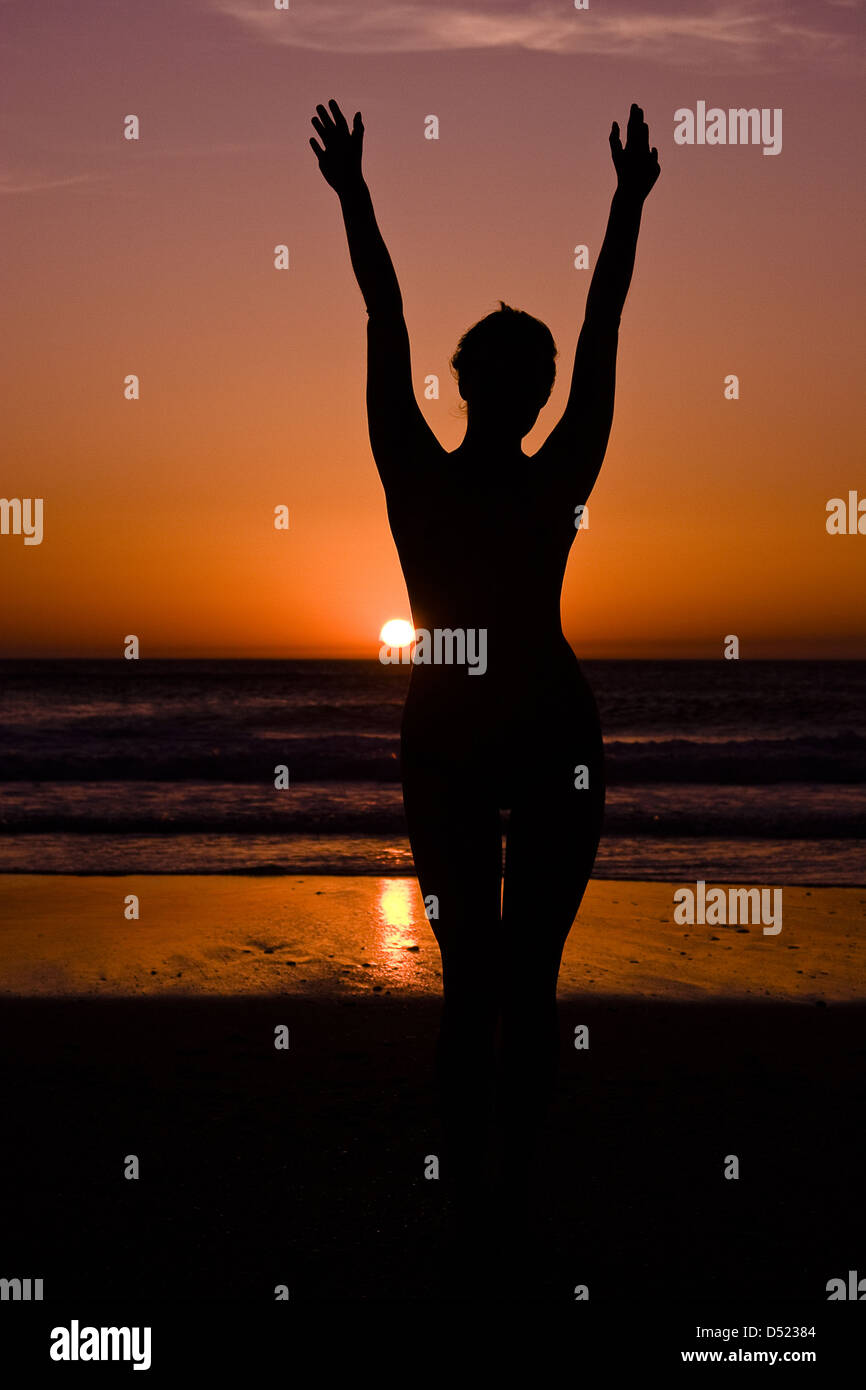 Young Woman in sunset Stock Photo - Alamy