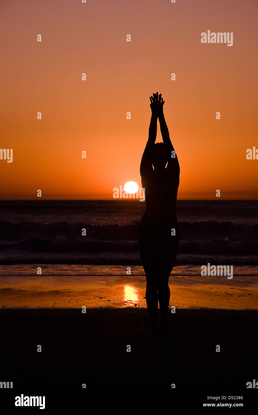 Woman in sunset hi-res stock photography and images - Alamy