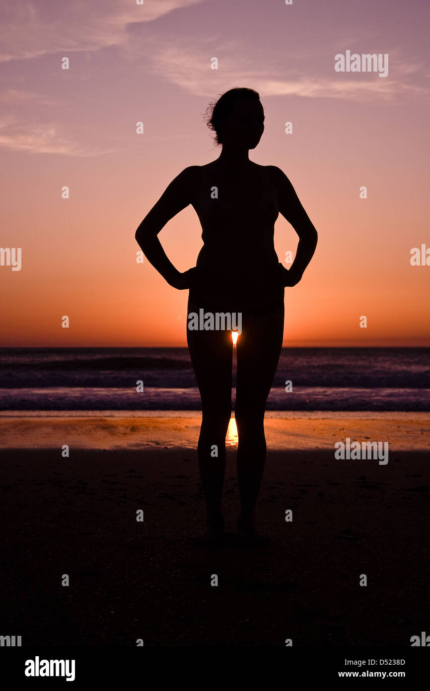 Young Woman in sunset Stock Photo - Alamy