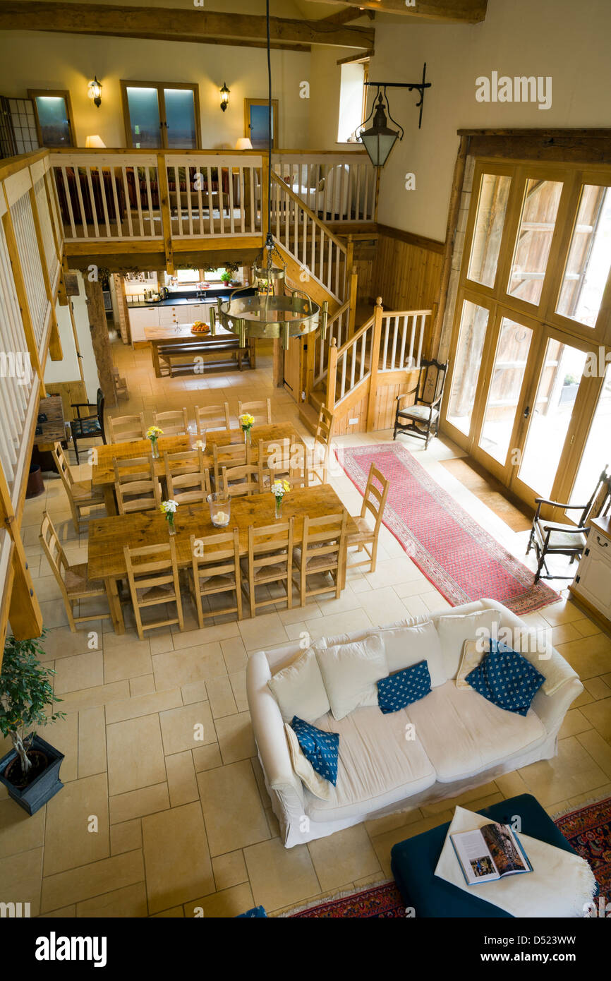 A view from above down onto a large communal living and dining area in ...
