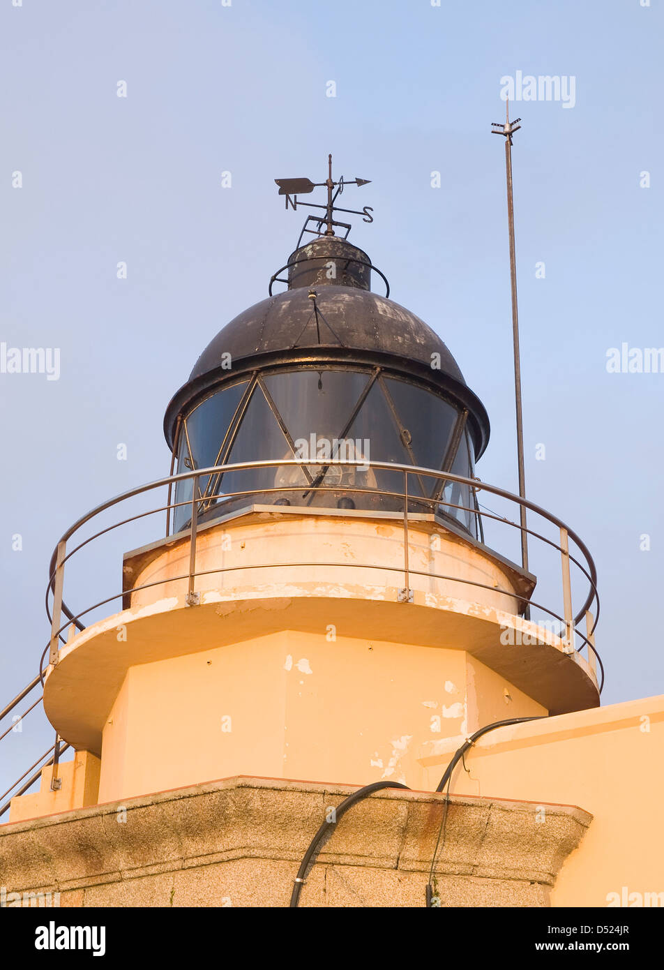 Lighthouse built on a building at sunset. Lighthouse built on a ...