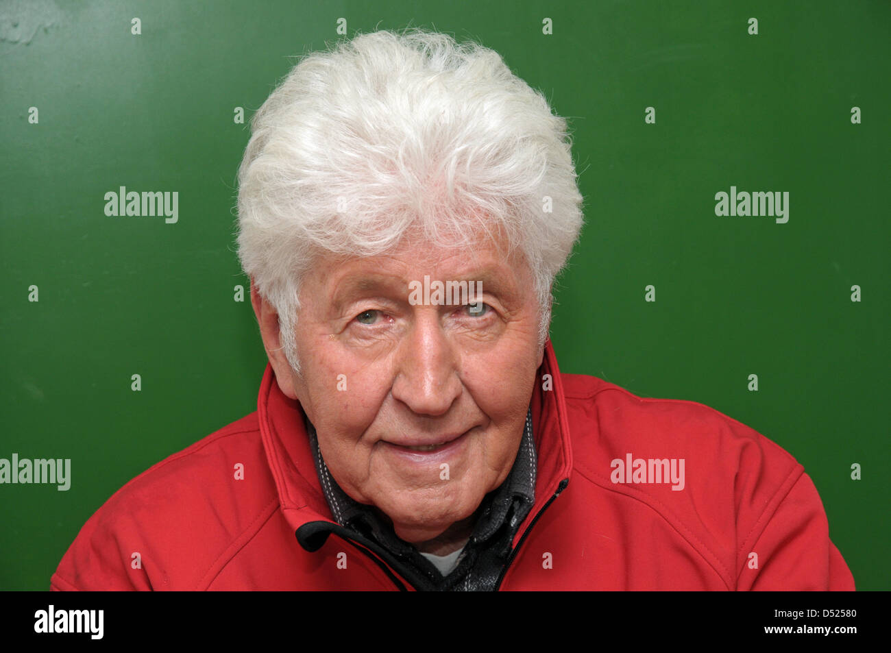 Choir master Gotthilf Fischer poses after he helped some vine makers ...