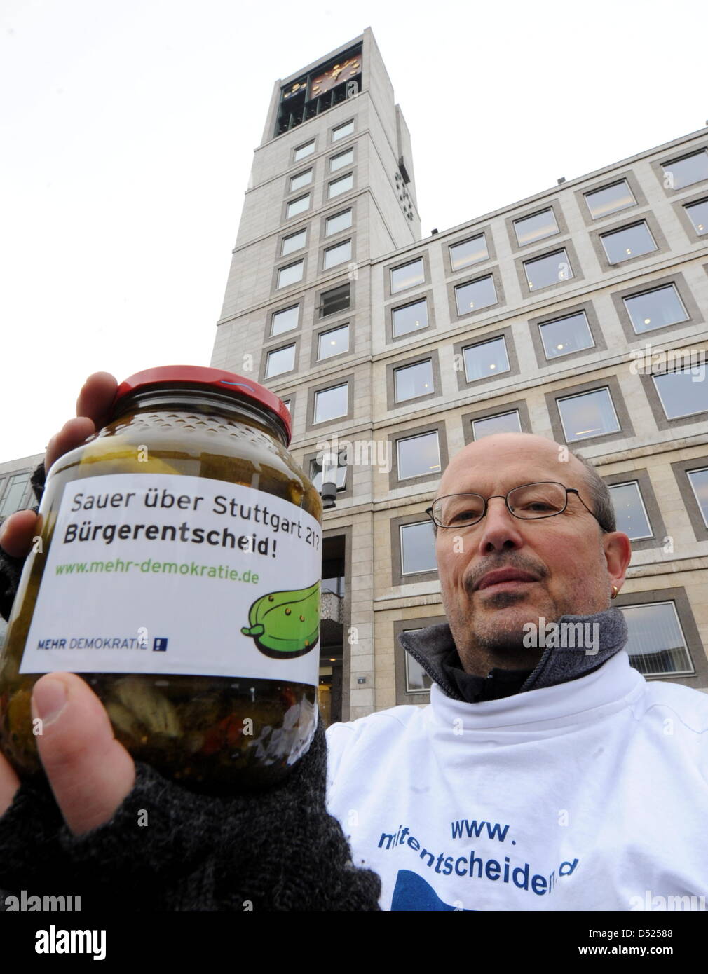 An opponent of the controversial railway project Stuttgart 21 protests ...