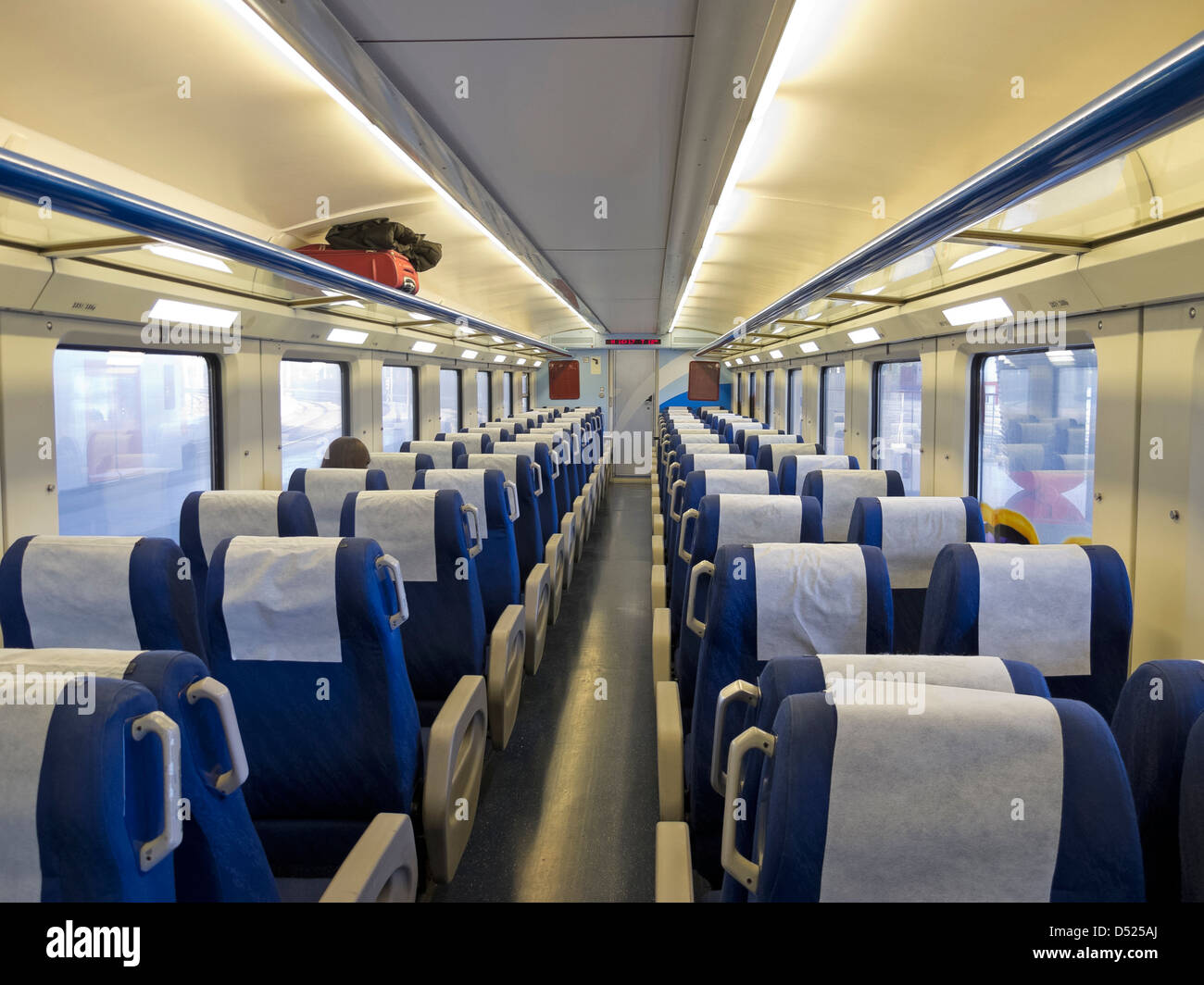 Contemporary train interior. Empty seats Stock Photo - Alamy