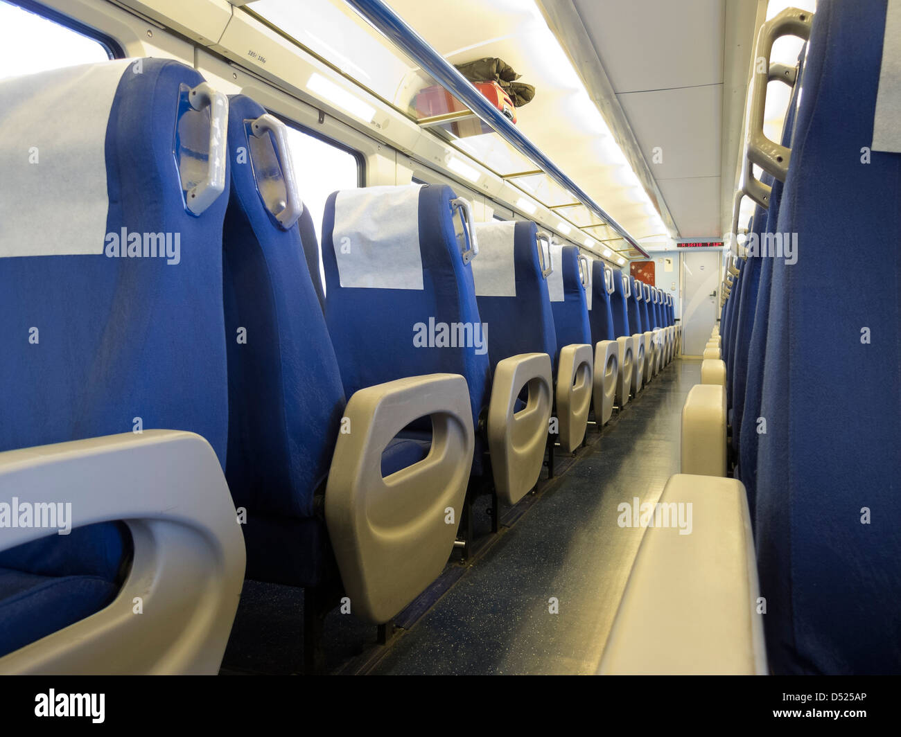 Contemporary train interior. Empty seats Stock Photo - Alamy