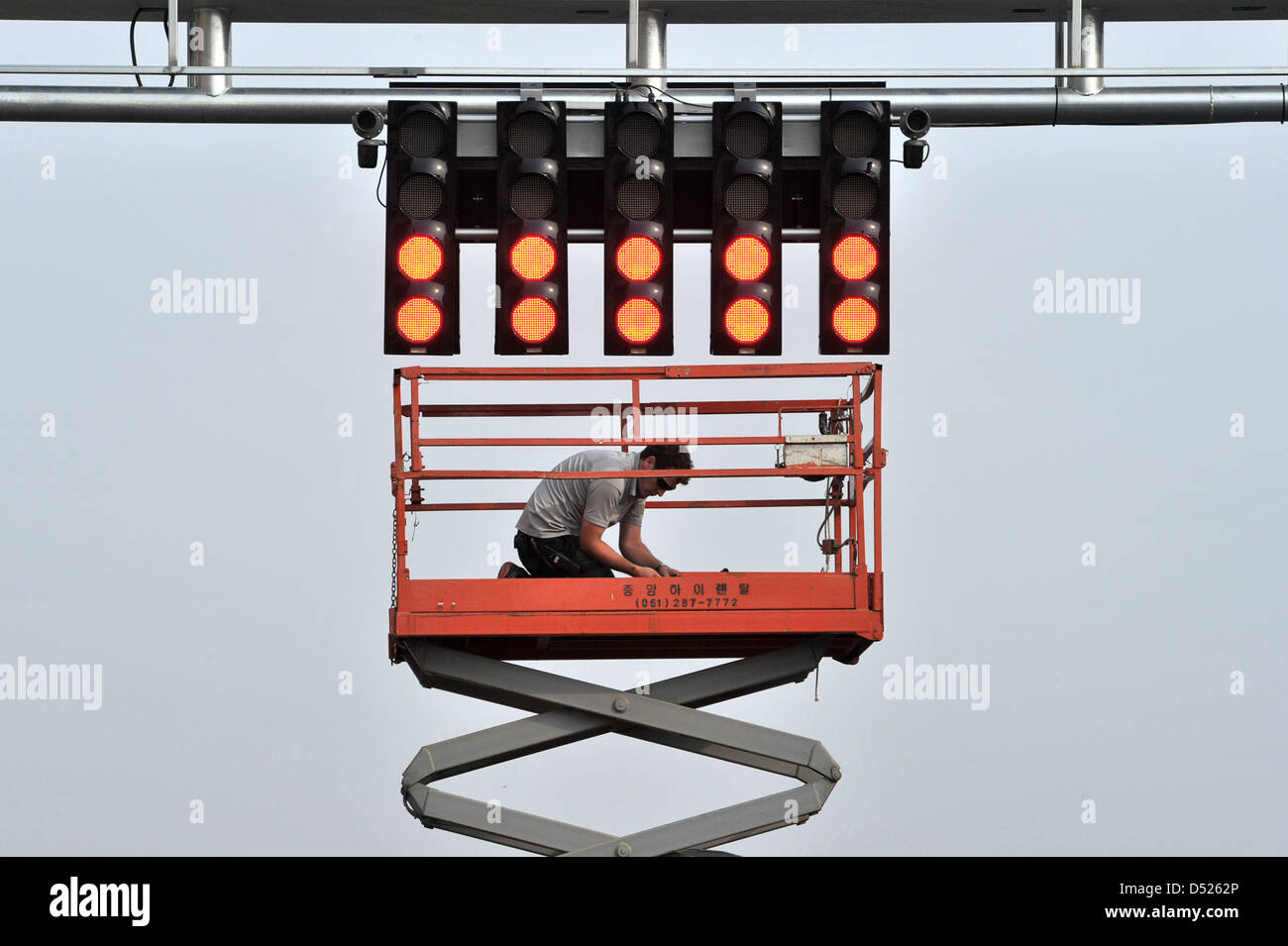 A technician works on the starting signal at the Korean International ...