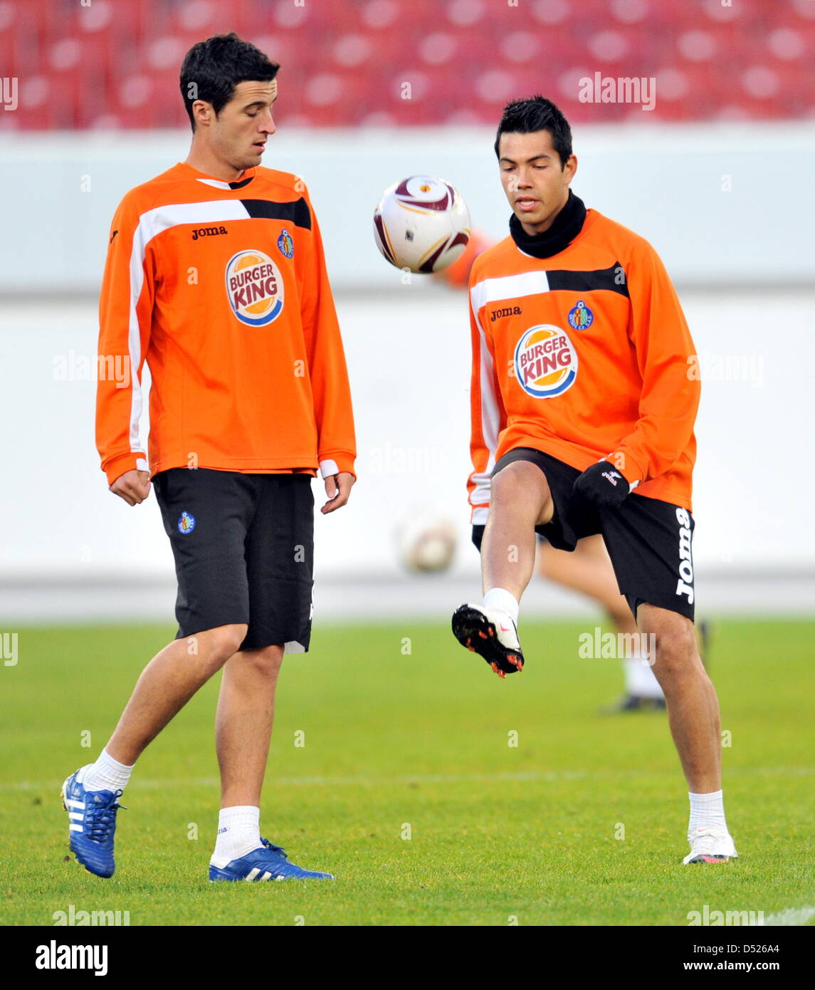 Players of the Spanish top-flight club FC Getafe, Ivan Marcano (L) and ...