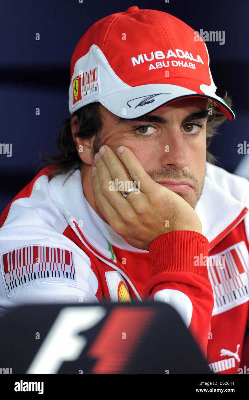 Spanish driver Fernando Alonso of Ferrari attends a press conference in ...