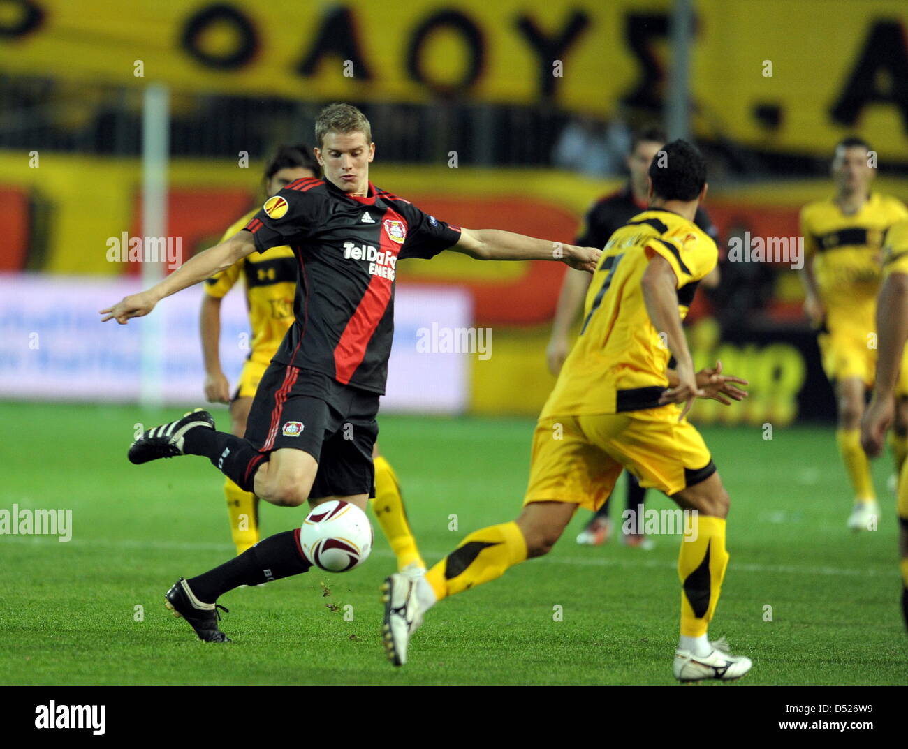 Thessaloniki's Toni Calvo (R) and Lars Bender of Leverkusen fight for ...