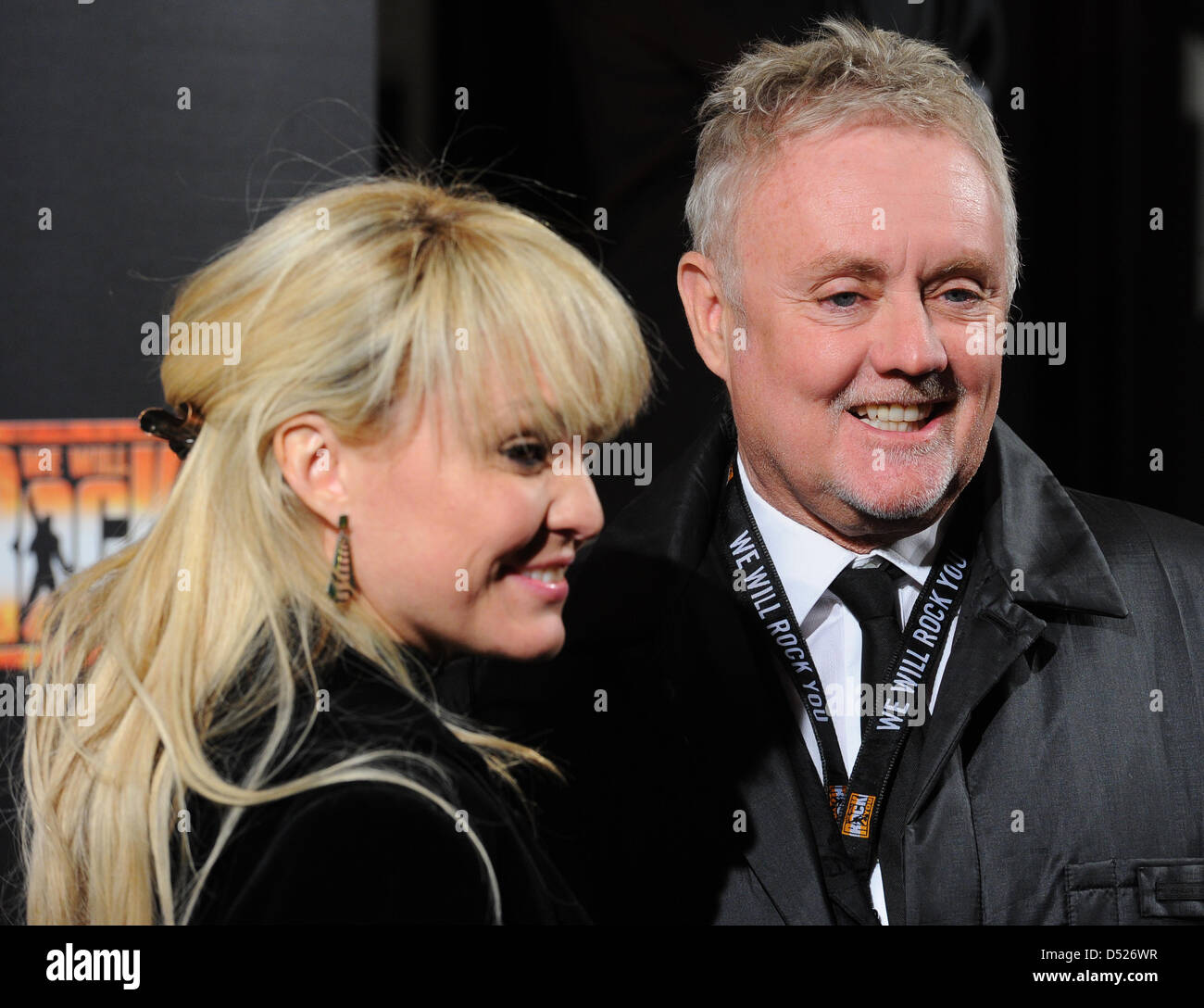 Former drummer of 'Queen', Roger Taylor (R) and his partner Serena ...
