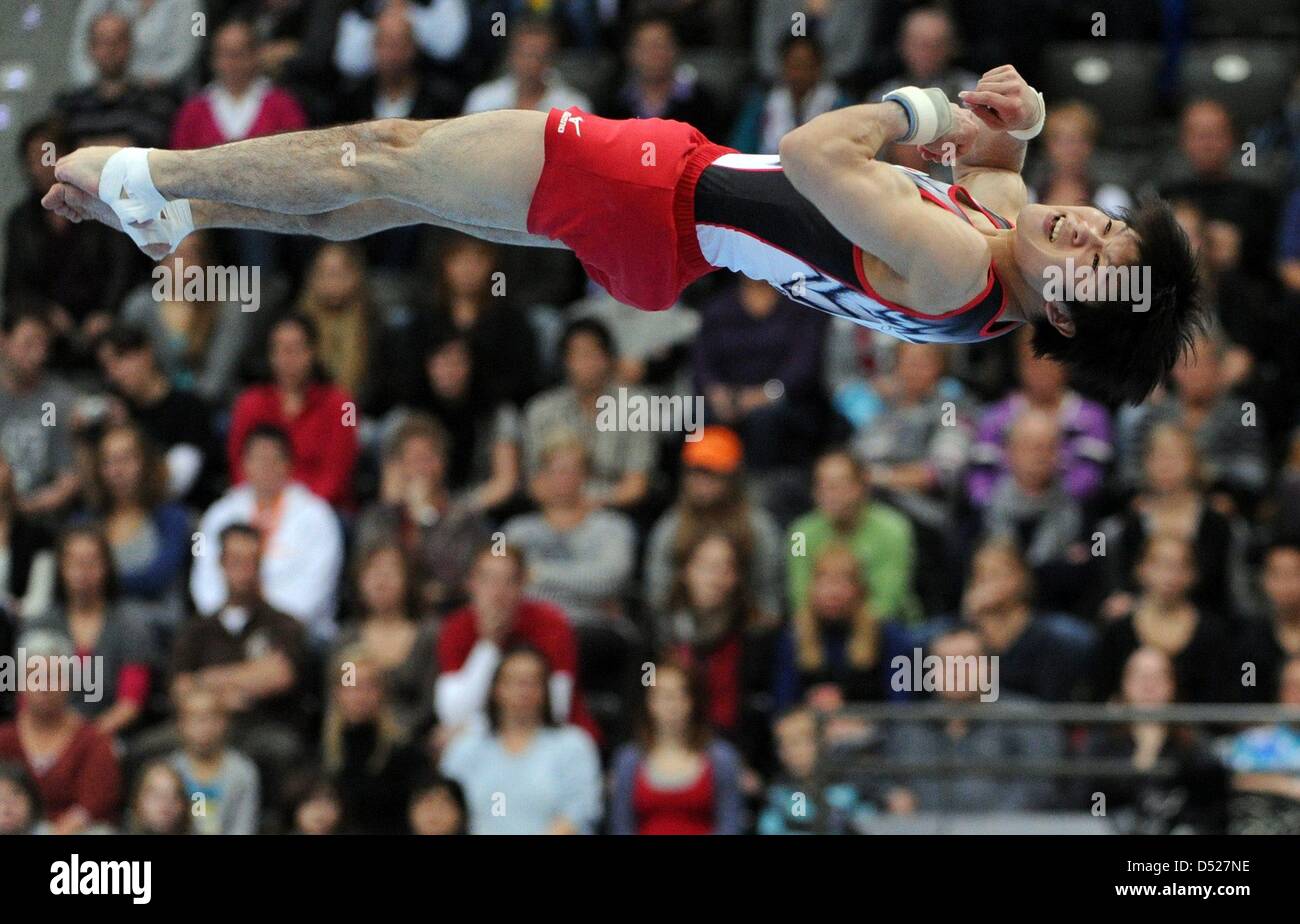 Gymnast Kohei Uchimura from Japan performs his skills during the finale ...