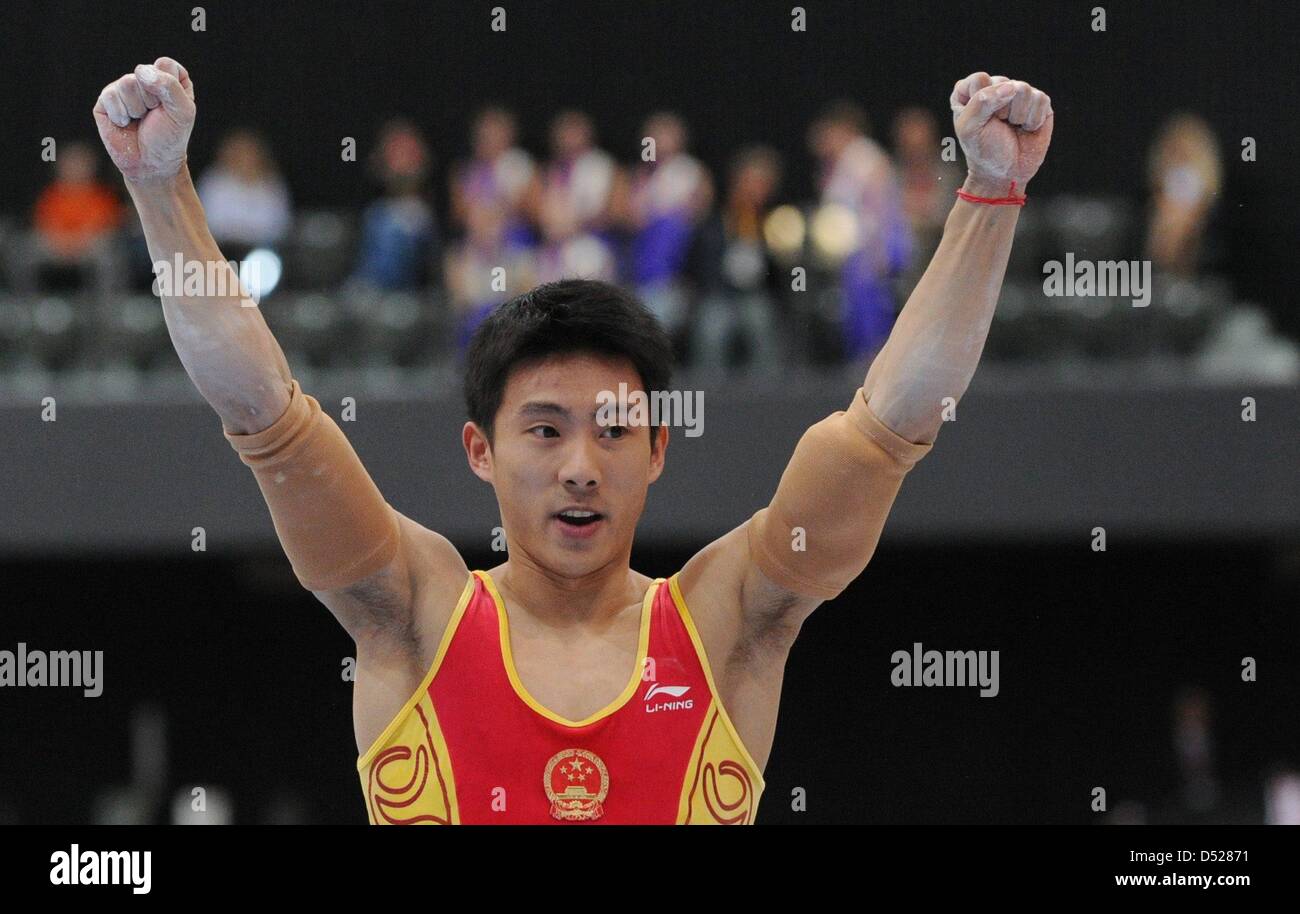Chinese gymnast and silver medal winner Teng Haibin cheers during the ...