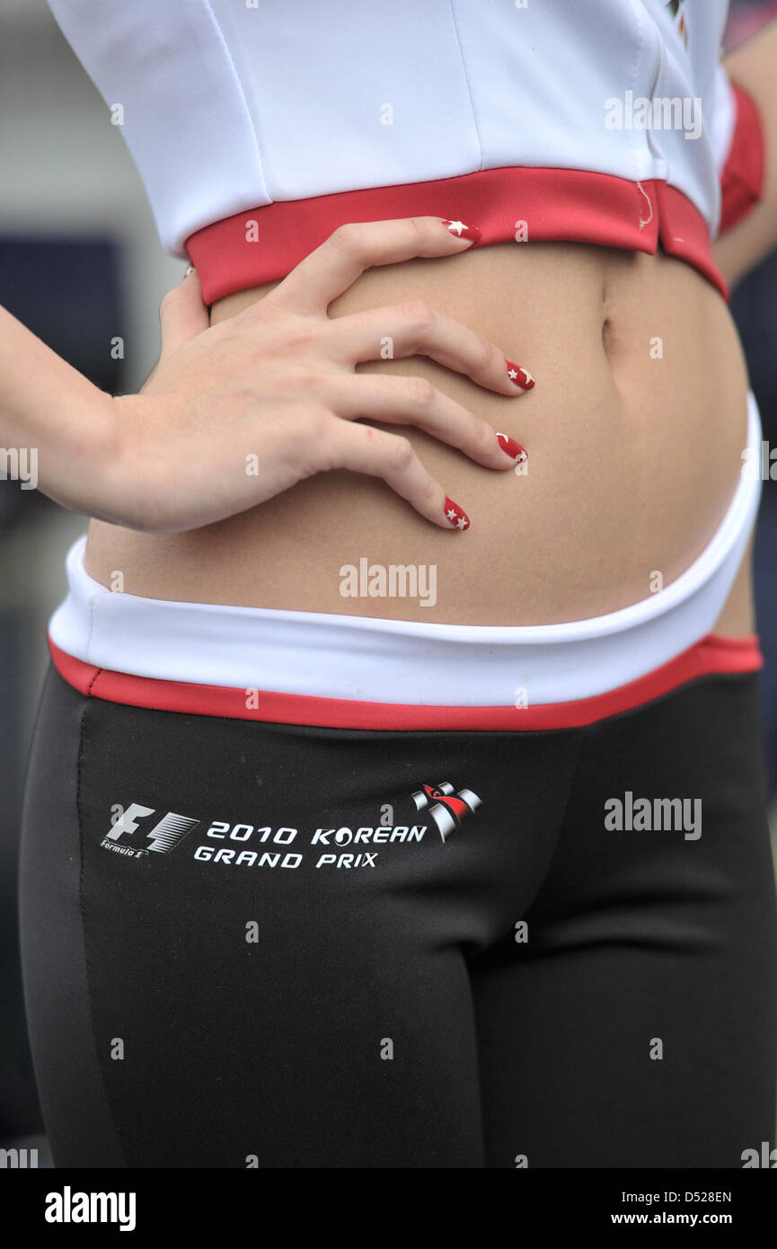 A grid girl wears a shirt exposing her belly during the Korean Grand Prix at the Korea ...