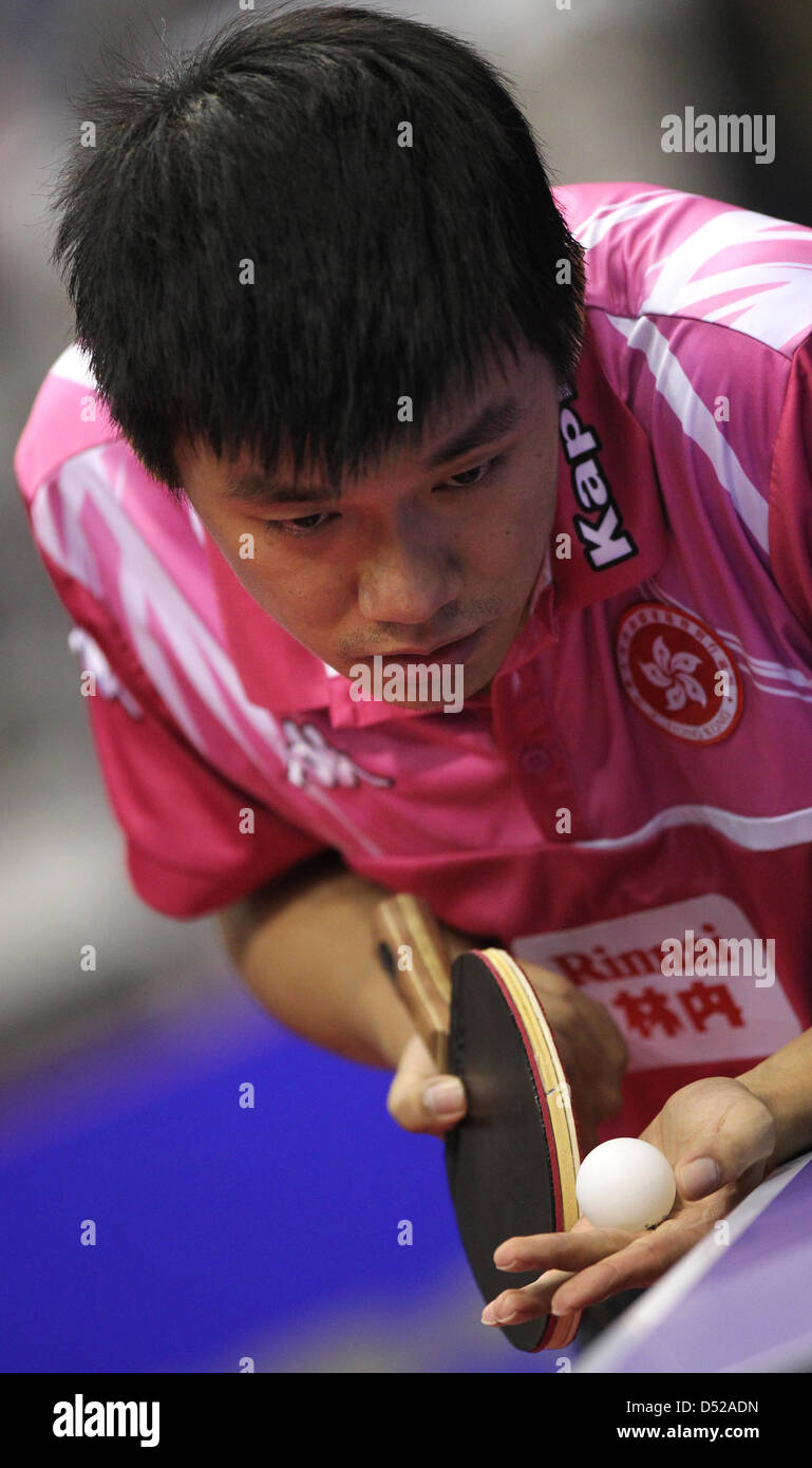 Chinese tennis pro Tang Peng gets ready to serve during the table ...